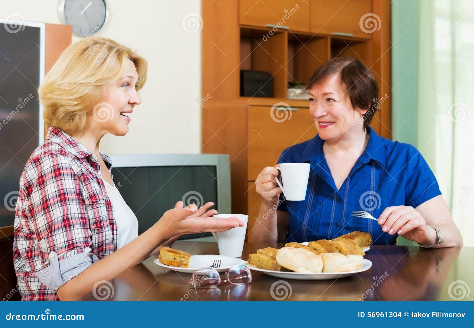 Colleagues Drinking Tea and Talking during Coffee Break Stock Photo ...