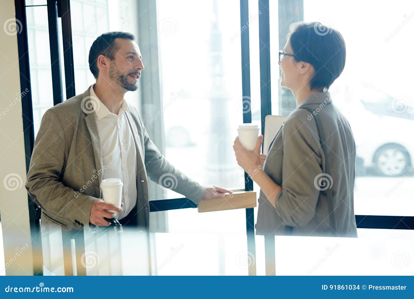 Colleagues with drinks stock photo. Image of coffeebreak - 91861034