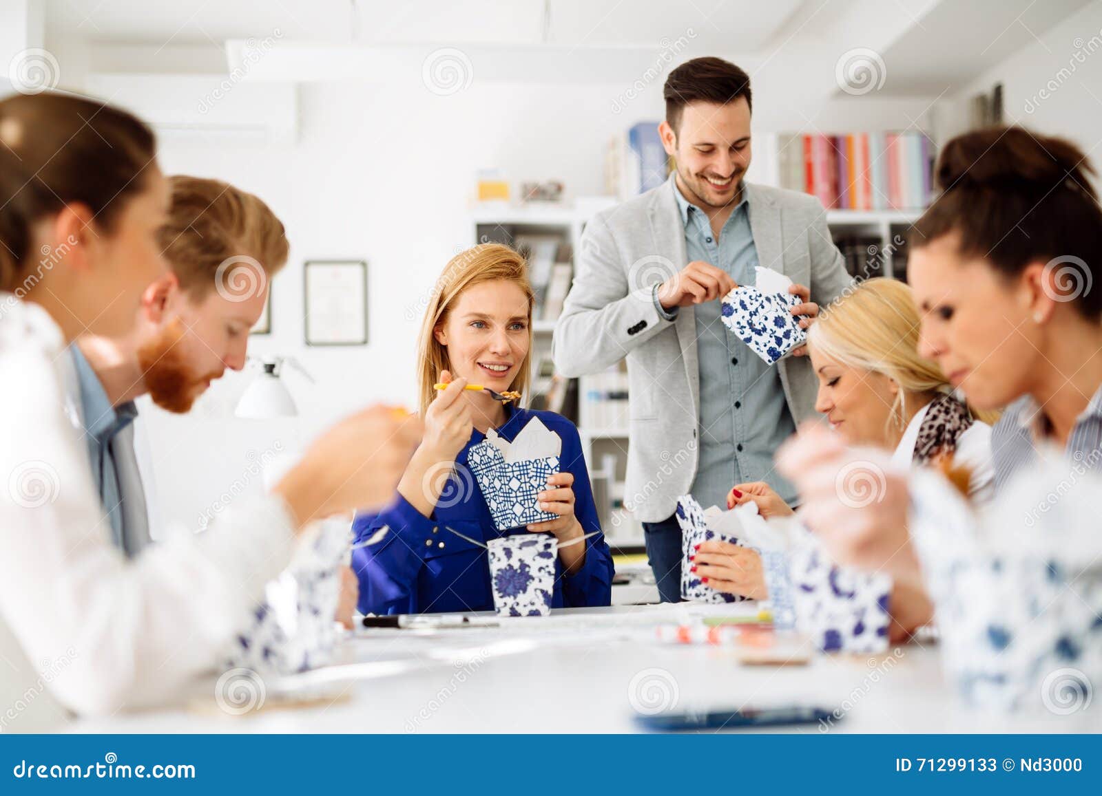 Colleagues Eating in Office Stock Image - Image of business, female ...