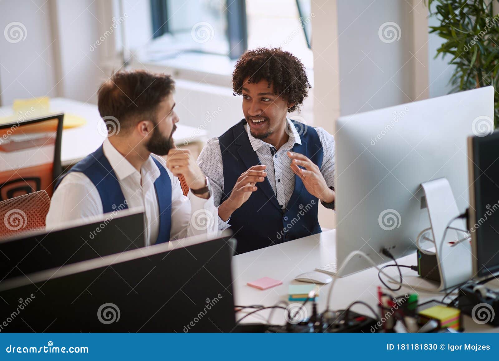 Colleagues Exchanging Opinion at Work in Office. Conversation, Business ...