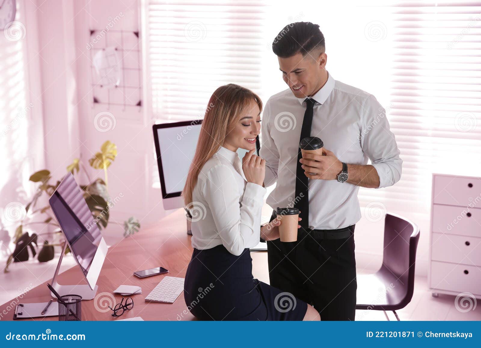 Colleagues Flirting with Each Other during Coffee Break in Office Stock ...