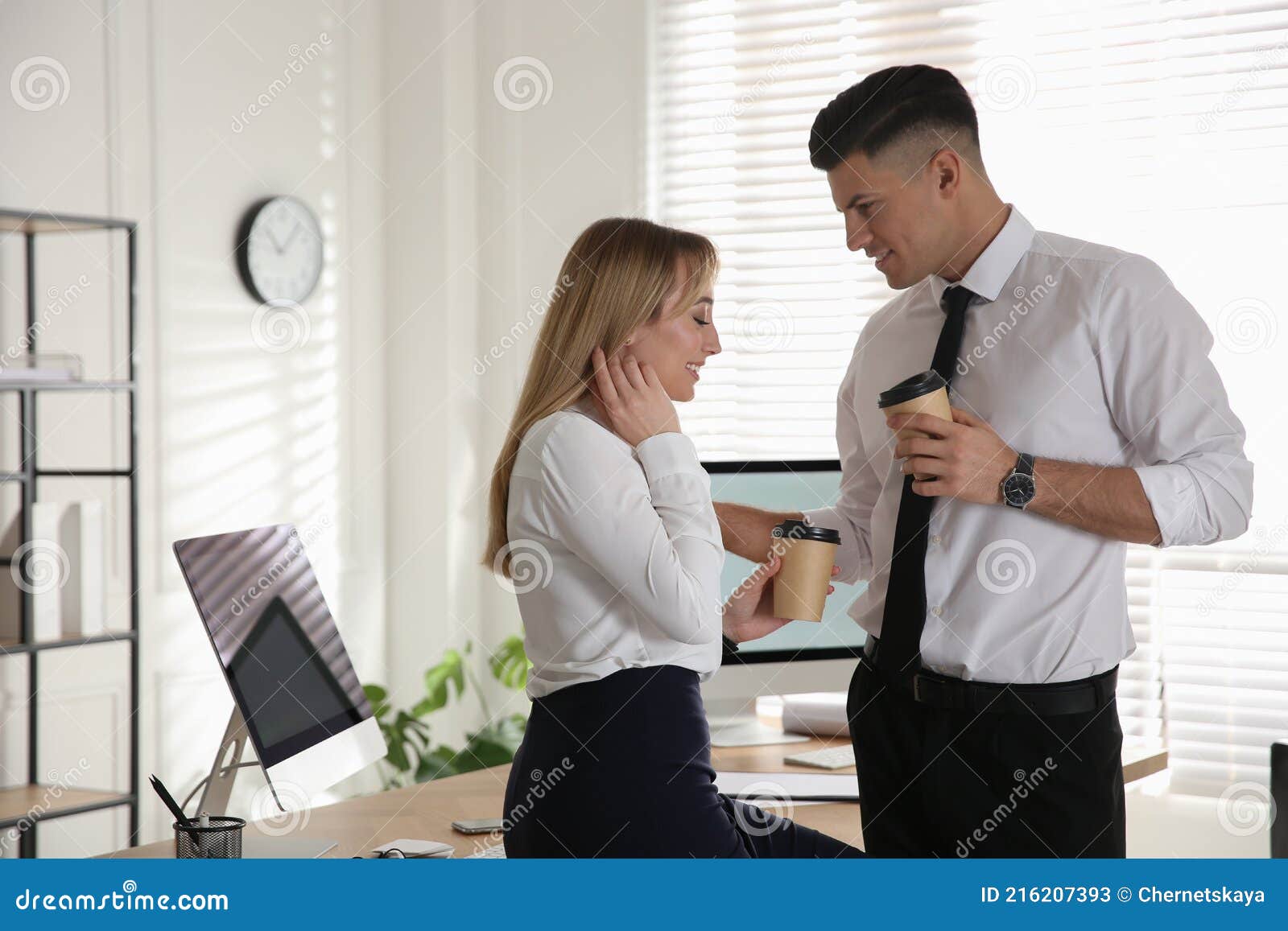 Colleagues Flirting with Each Other during Coffee Break in Office ...