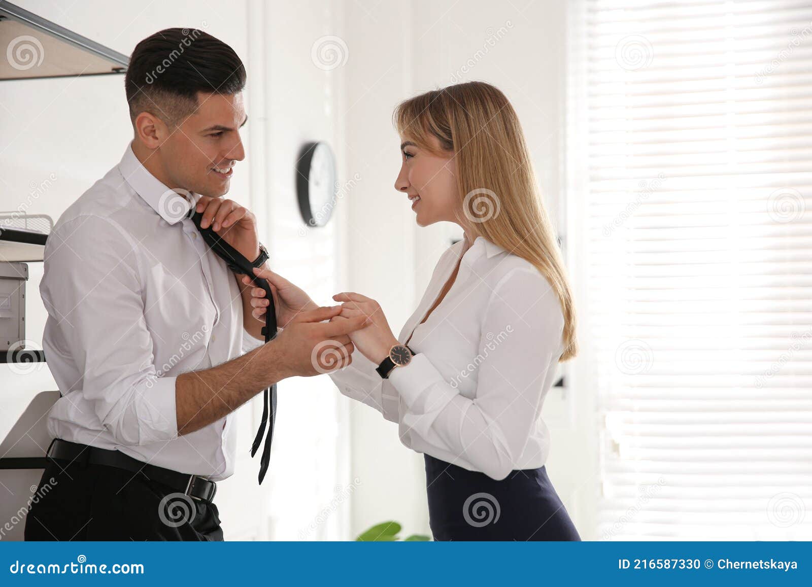 Colleagues Flirting with Each Other in Office Stock Photo - Image of ...