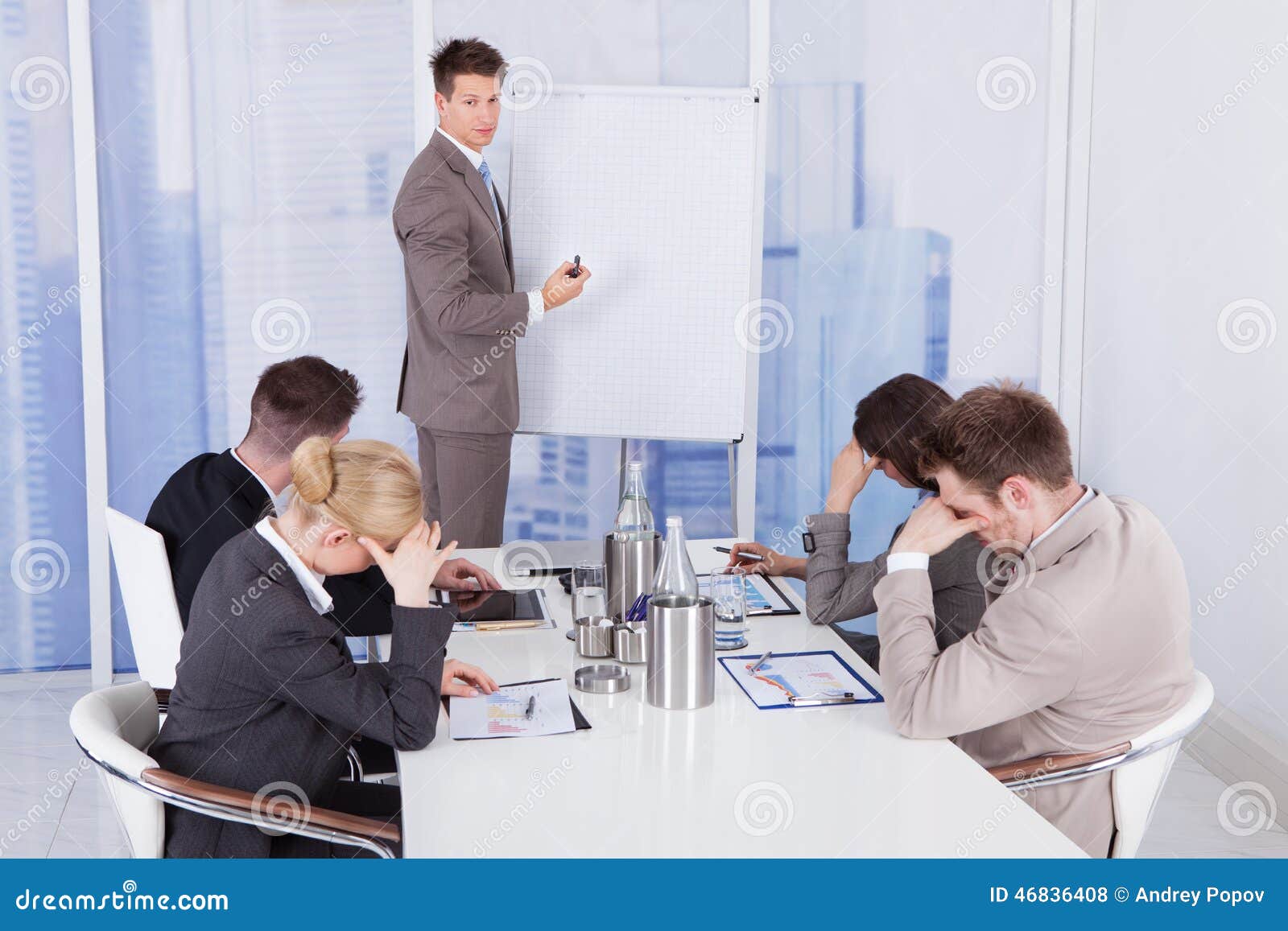 Colleagues Getting Bored during Business Presentation Stock Photo ...