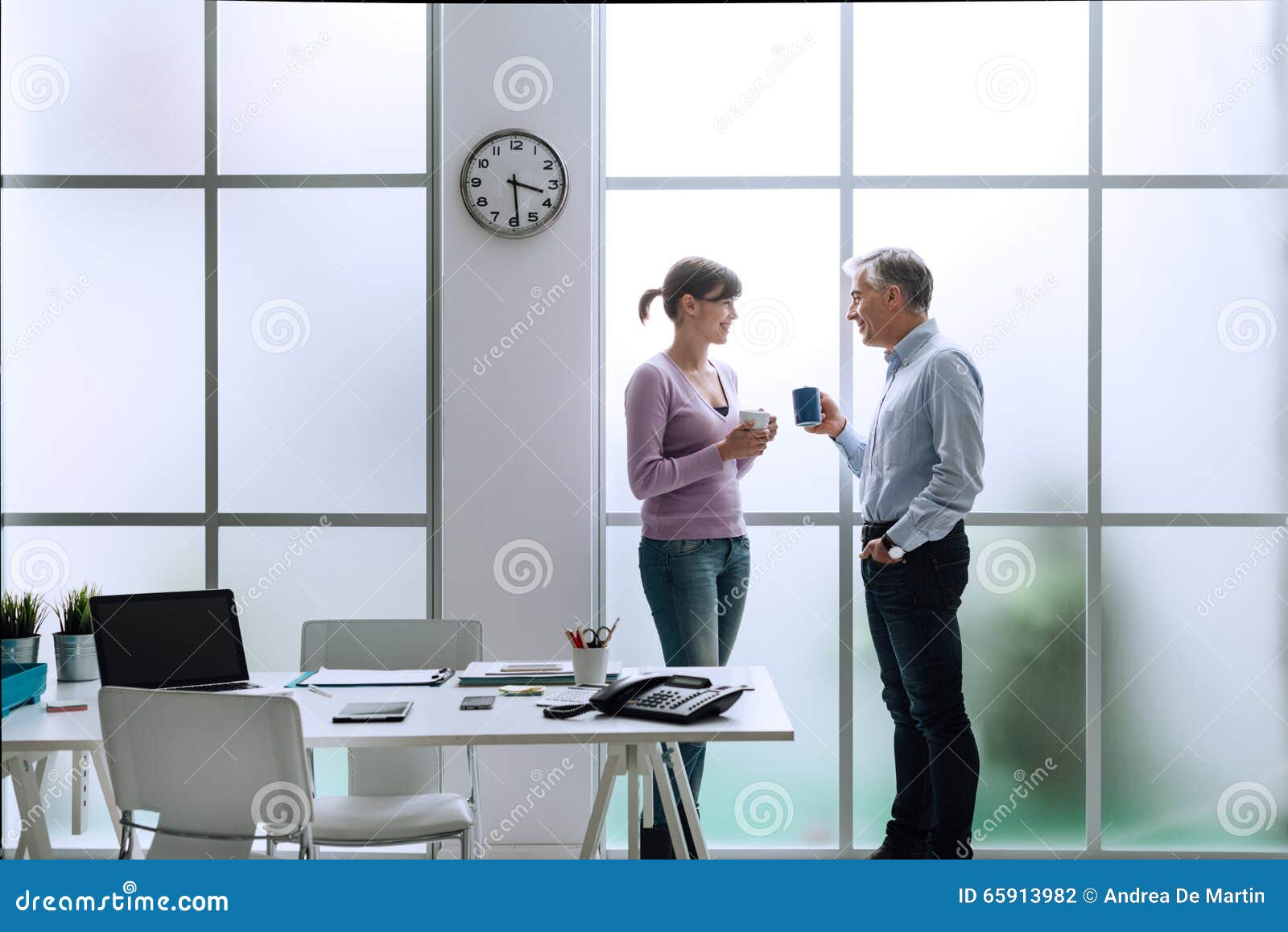 Colleagues Having a Coffee Break Stock Photo - Image of office ...
