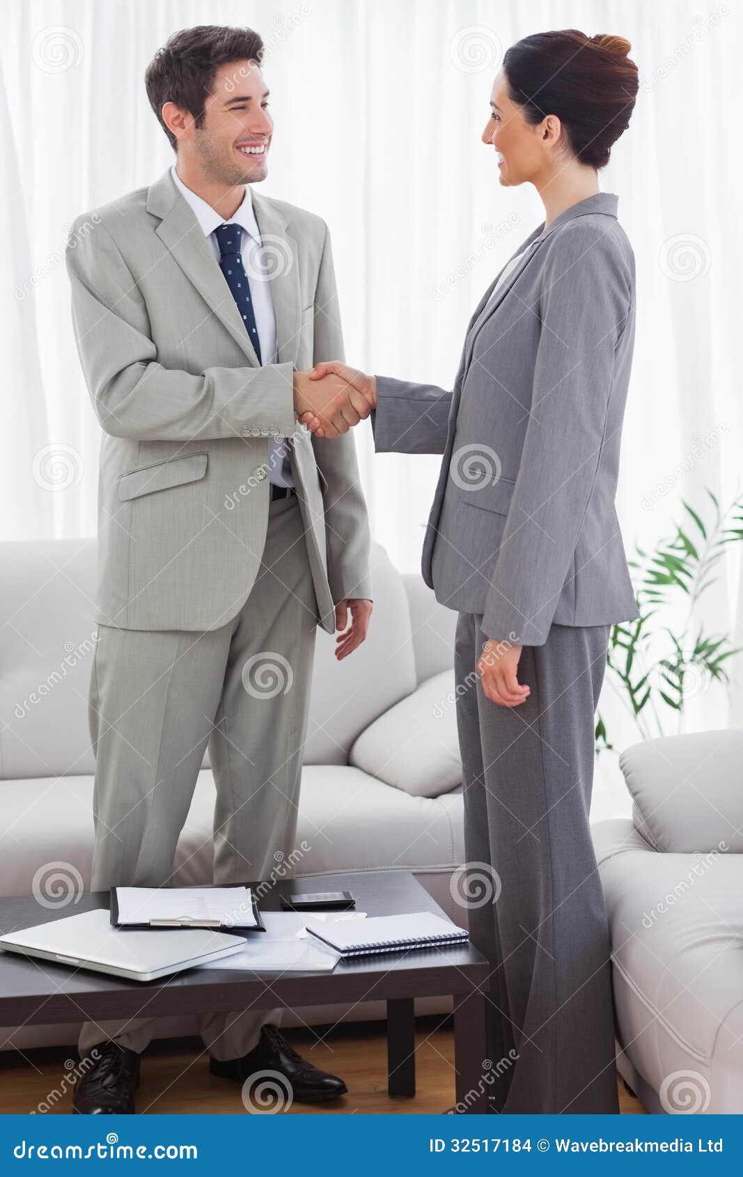 Colleagues Having Handshake during Meeting Stock Photo - Image of ...