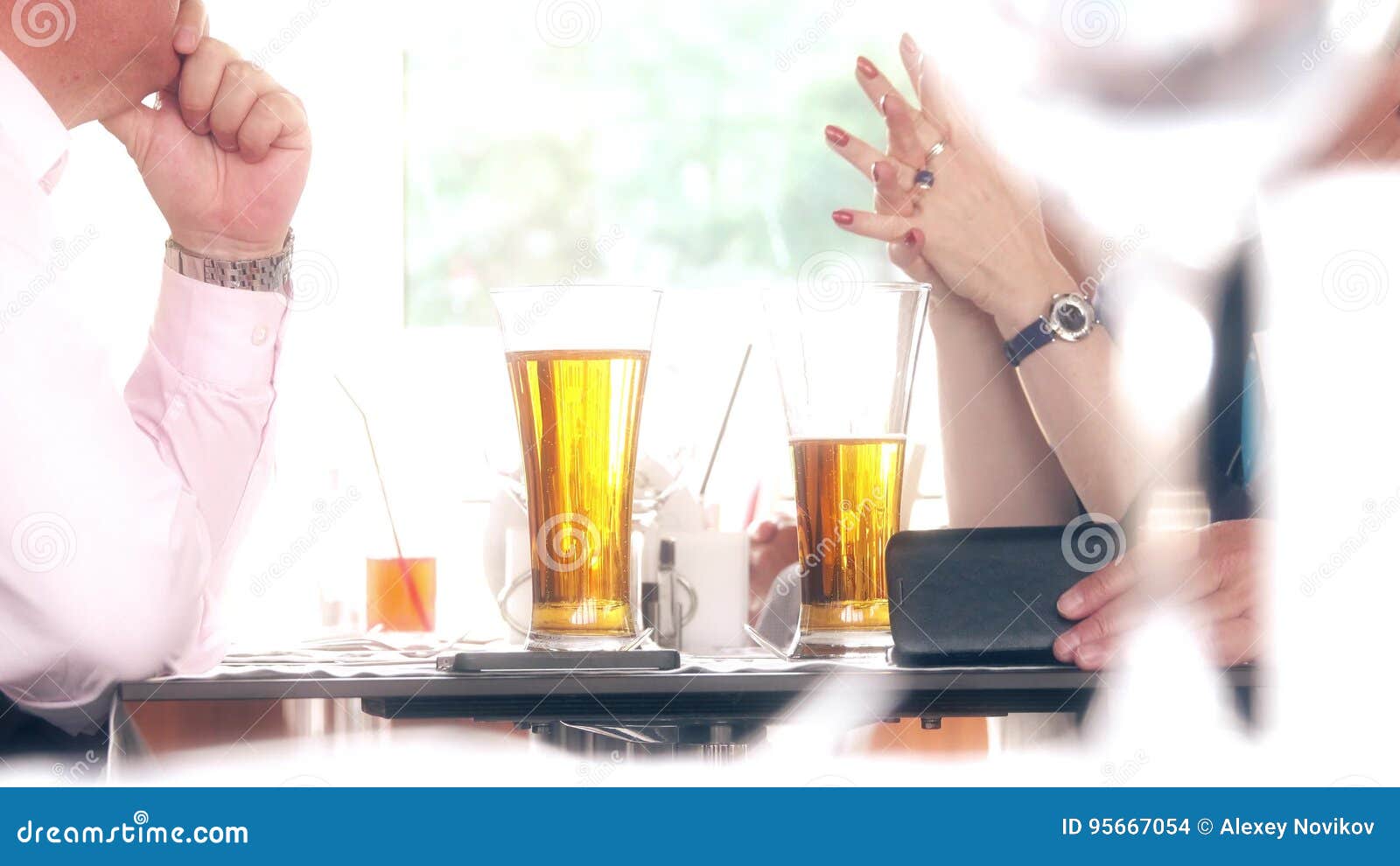 Colleagues Having Table Conversation at the Restaurant Stock Photo ...