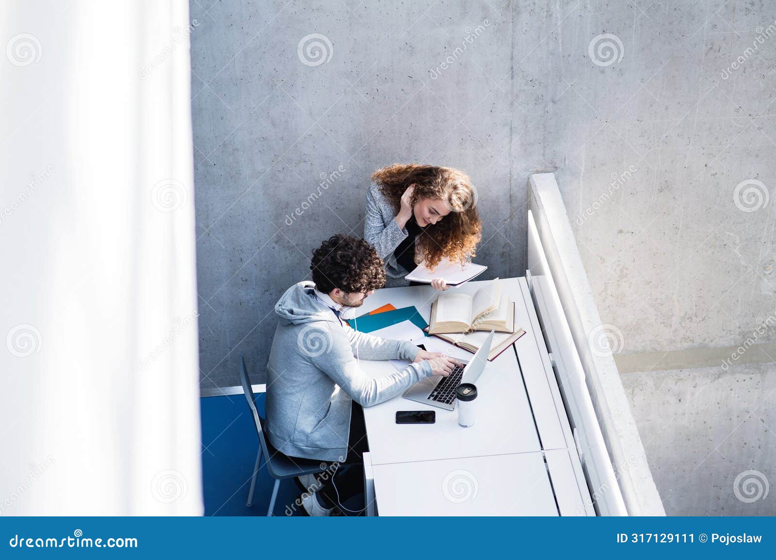 Colleagues Helping Each Other, Working on Project Together ...