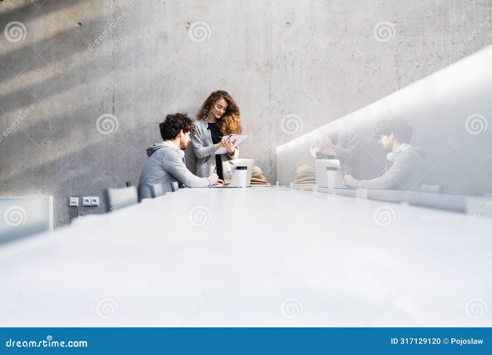 Colleagues Helping Each Other, Working on Project Together ...