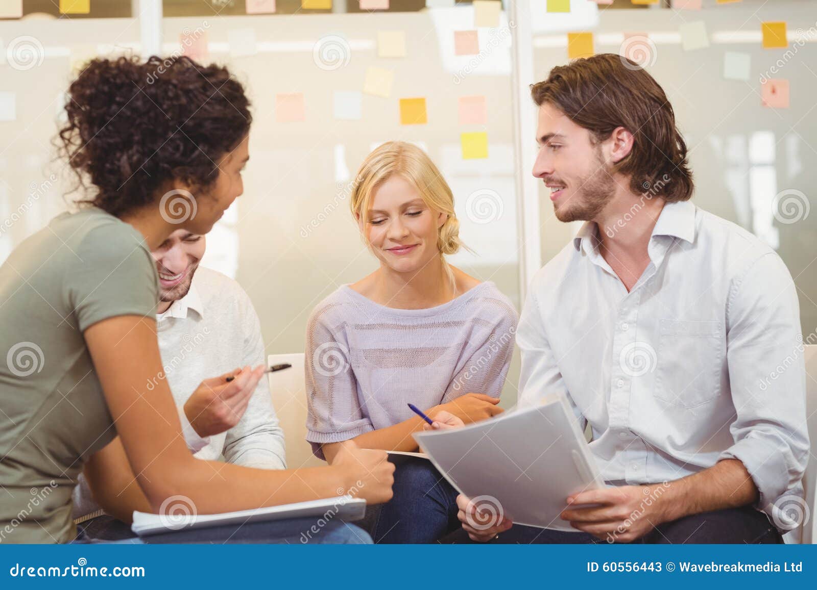 Colleagues Interacting with Each Other Stock Image - Image of dressed ...