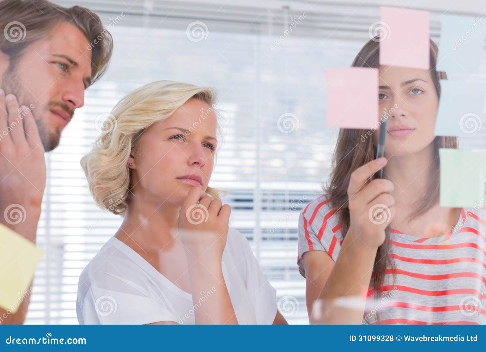 Colleagues Looking Doubtful Stock Photo - Image of planning, casual ...
