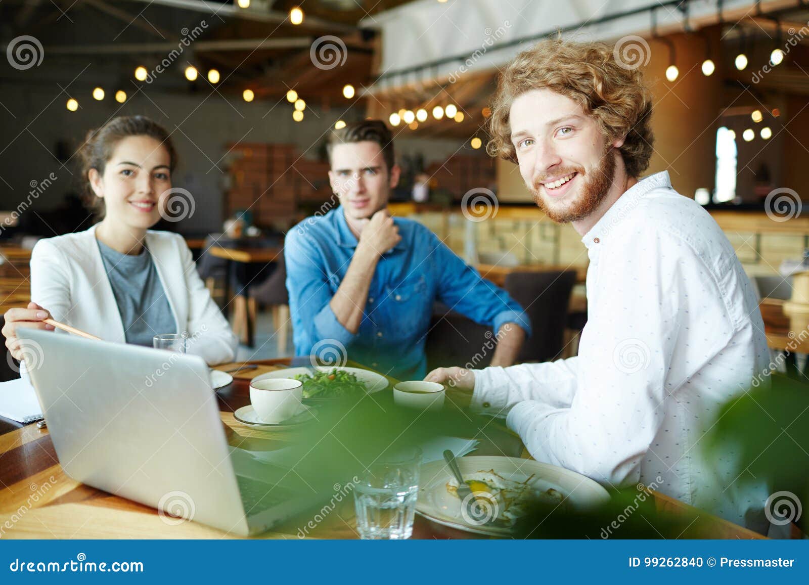 Colleagues at lunch break stock photo. Image of associates - 99262840