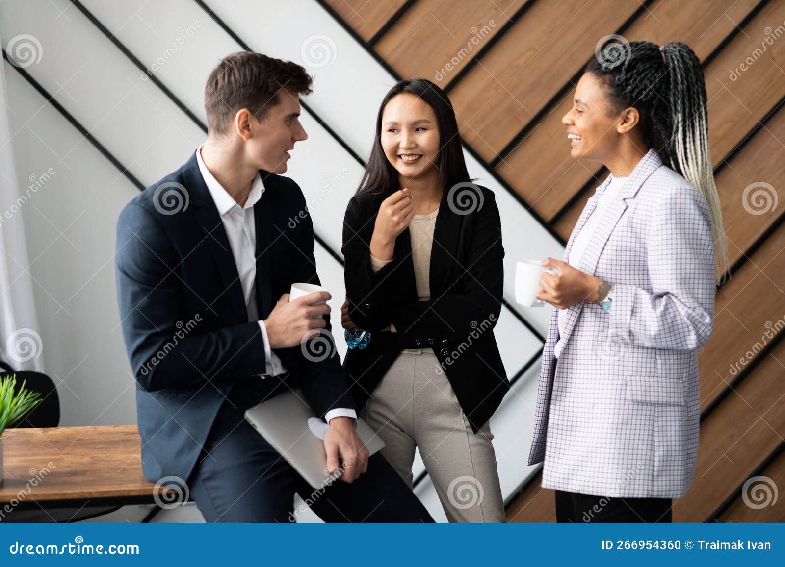 Colleagues in the Office Communicate during a Work Break Stock Photo ...