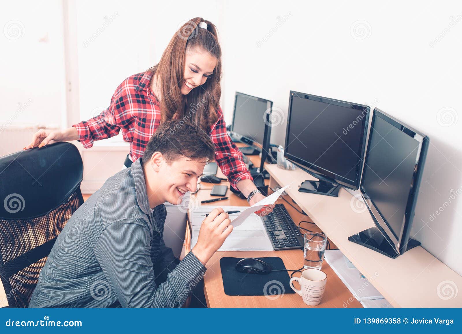 Colleagues Planning Productive Working Process in Office Stock Photo ...