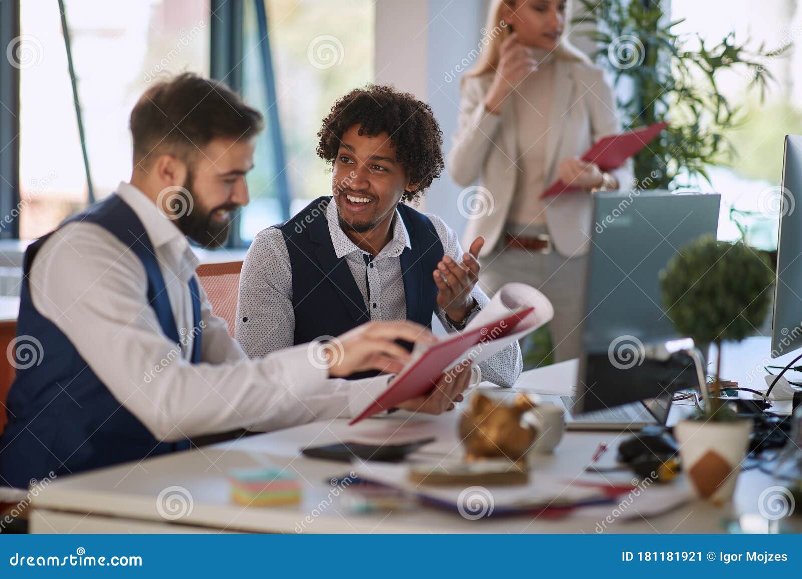 Colleagues Sharing Plan, Report, Data, Stats, Content in the Office at ...