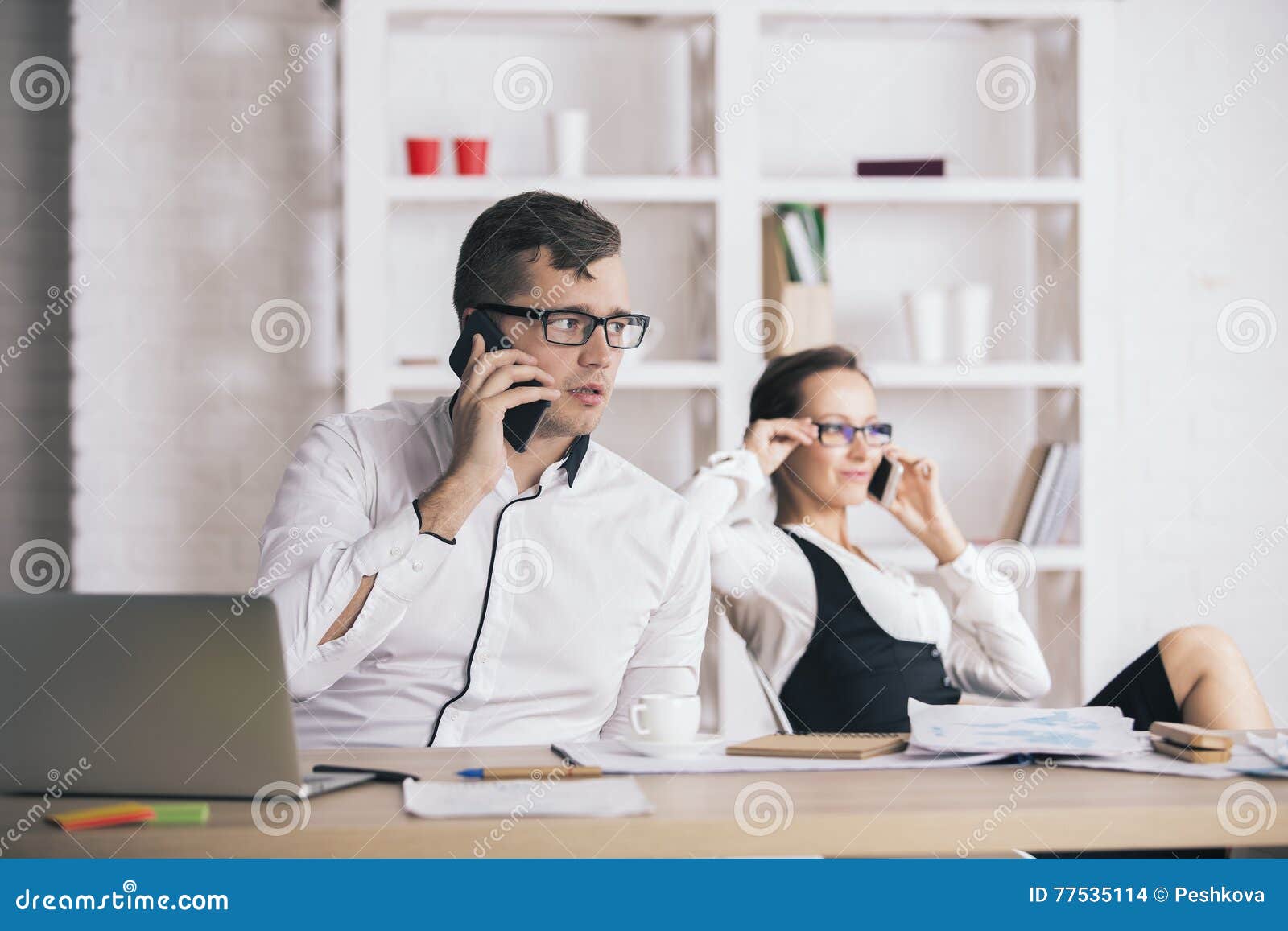 Colleagues Talking on Mobile Phones Stock Photo - Image of ...