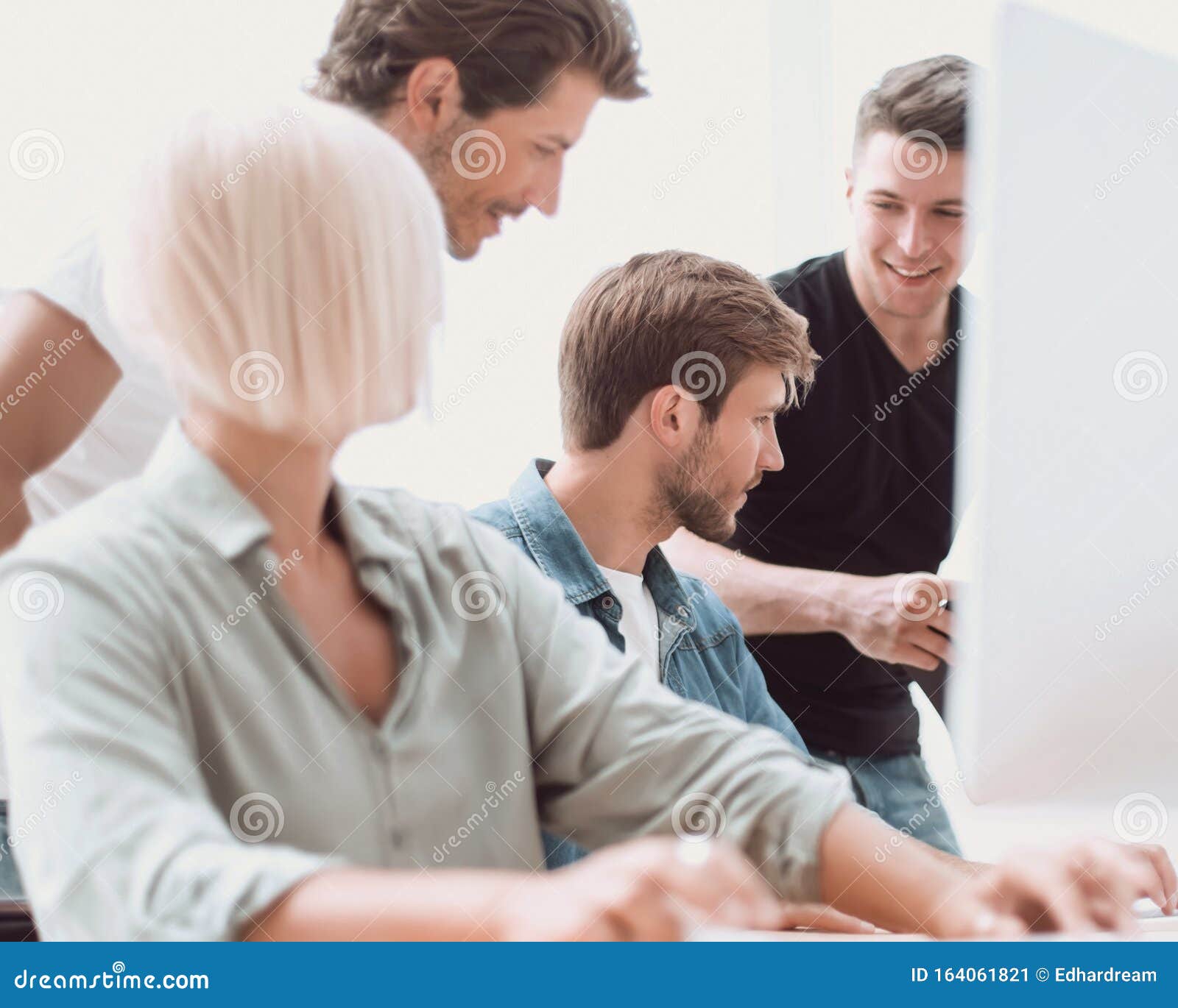 Colleagues Use a Computer for Office Work. Stock Image - Image of ...