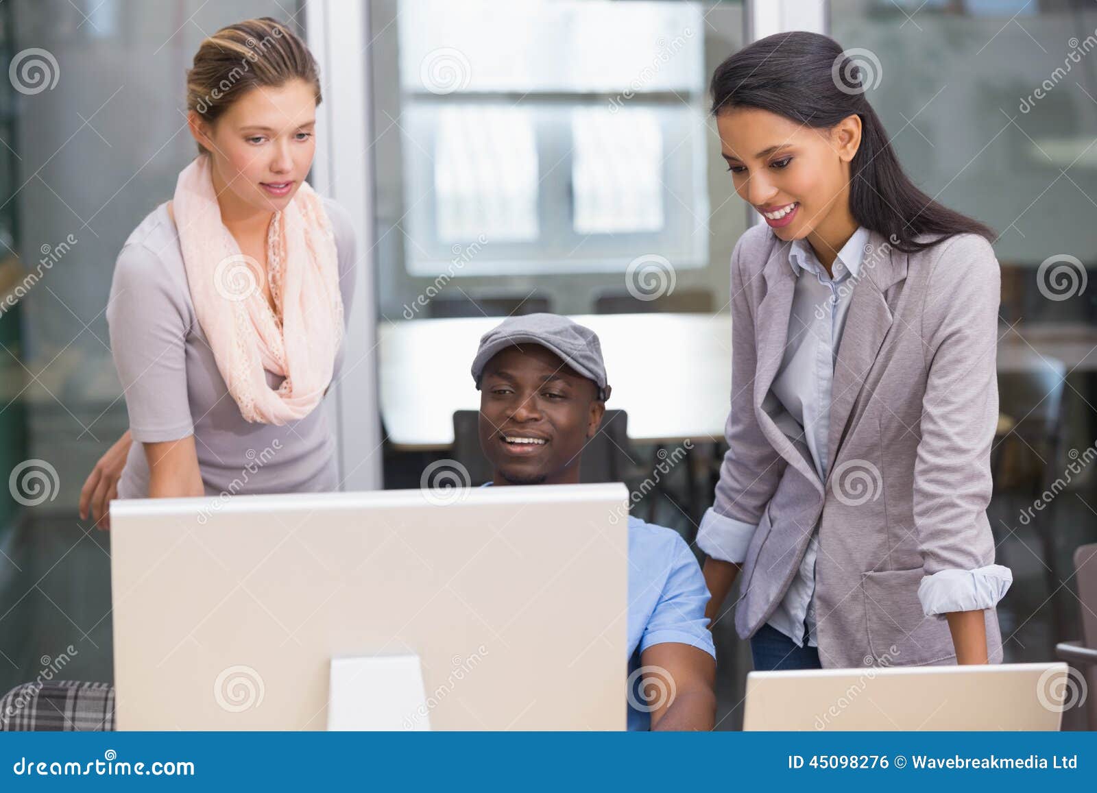 Colleagues Using Computer at Office Stock Photo - Image of office ...