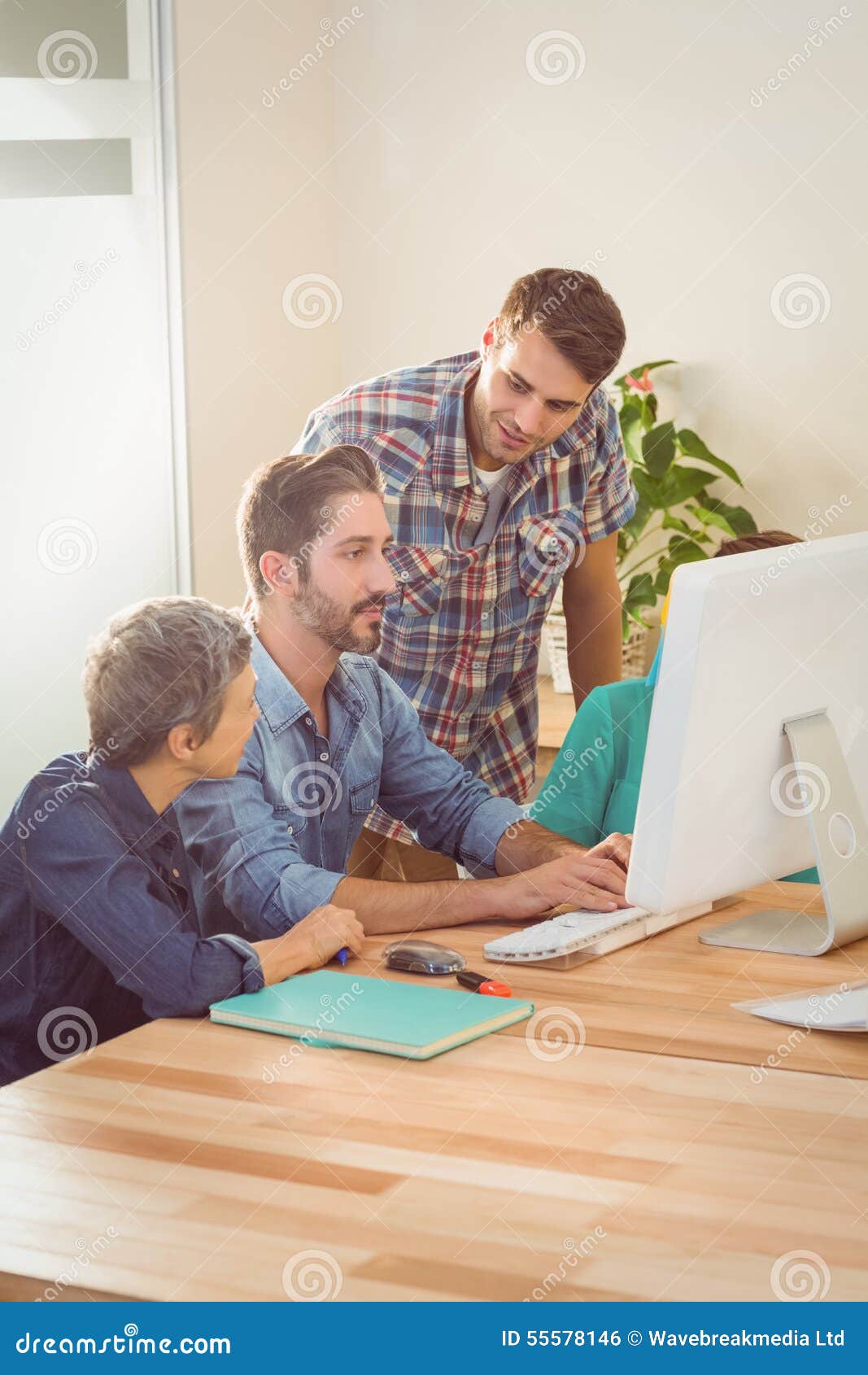 Colleagues Using Laptop at Office Stock Photo - Image of briefing ...