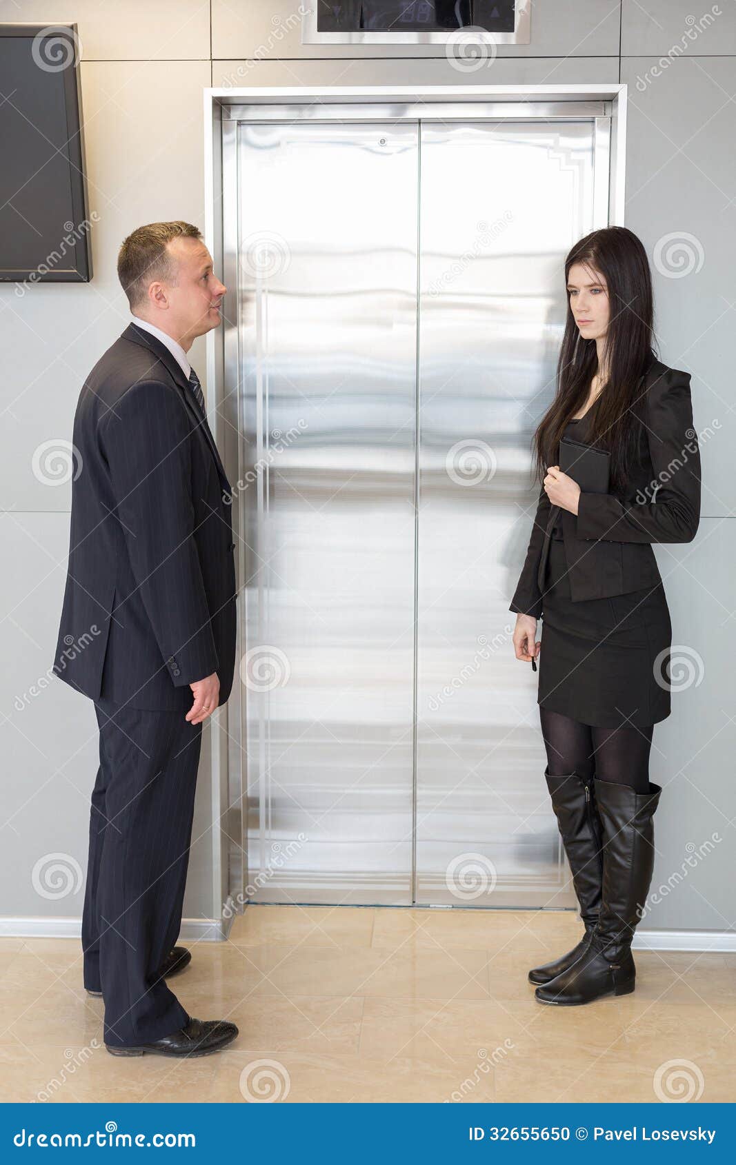 Colleagues Waiting for Elevator Stock Photo - Image of employees, full ...