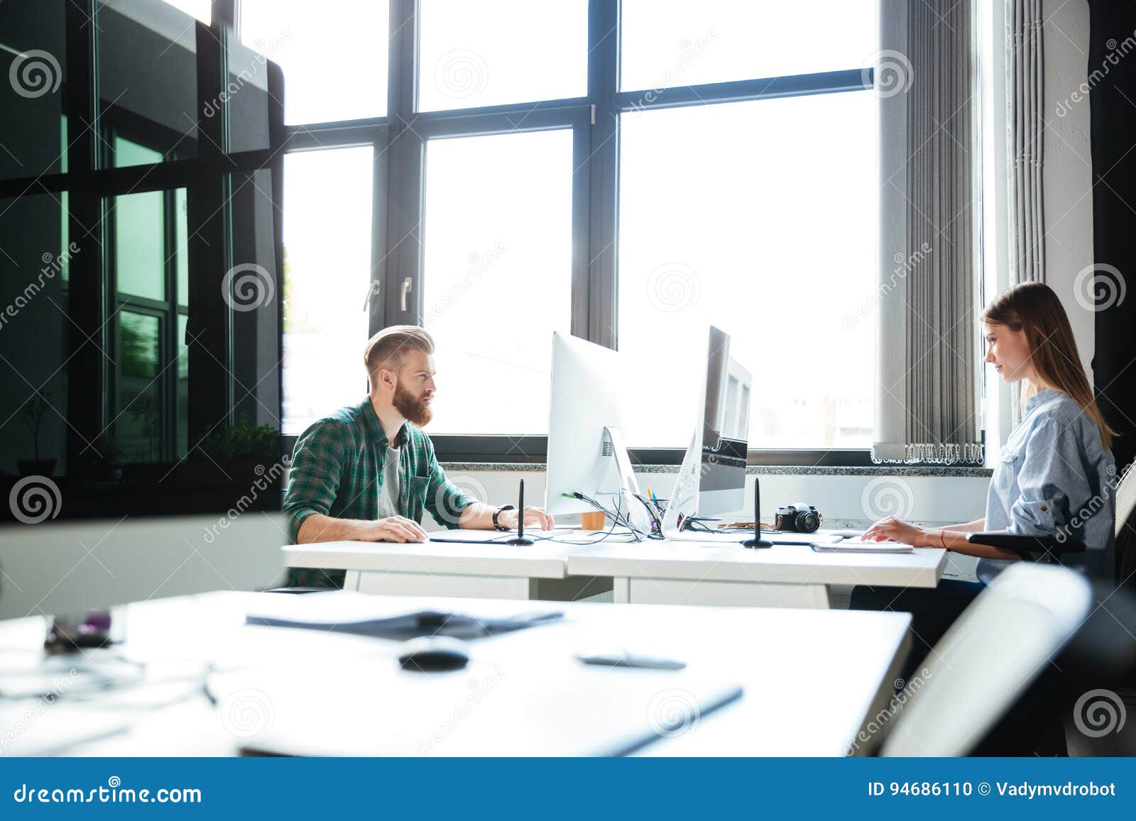 Colleagues Work in Office Using Computers Stock Photo - Image of ...
