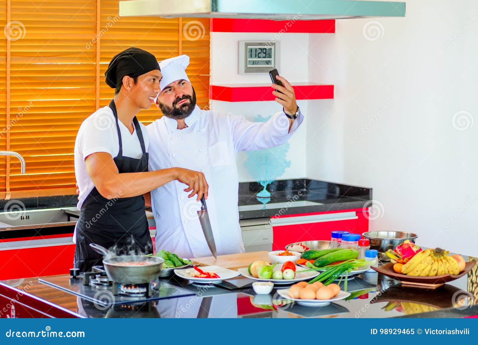 Colleagues at Work: Thai and European Chefs at the Kitchen Doing Stock ...