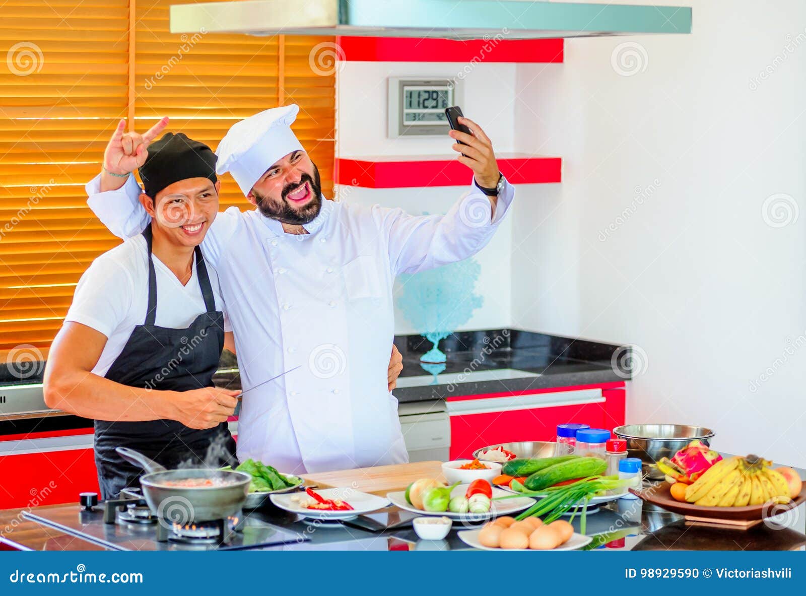 Colleagues at Work: Thai and European Chefs at the Kitchen Doing Stock ...