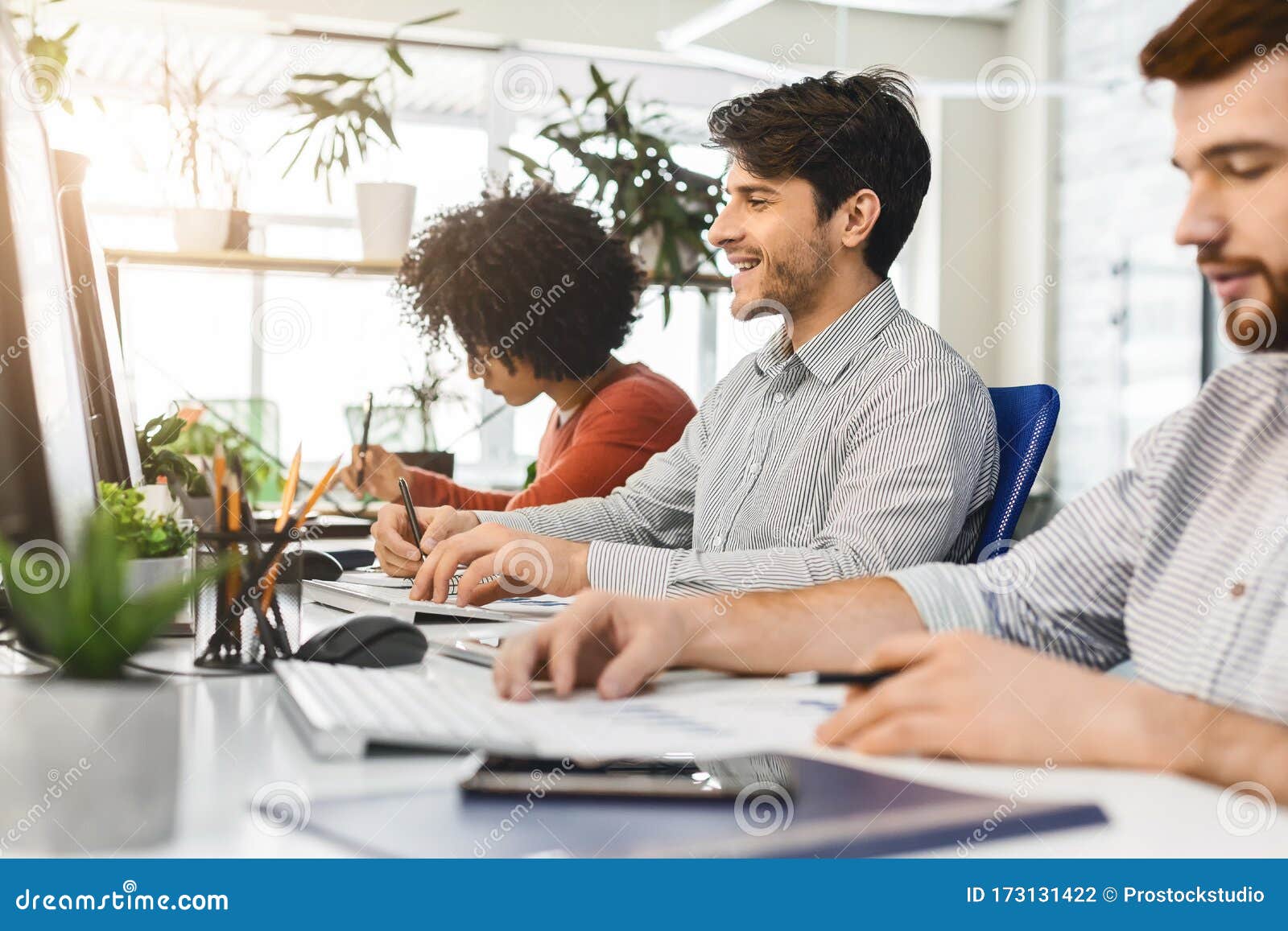 Colleagues Working in Front of Computers in Coworking Space Stock Photo ...