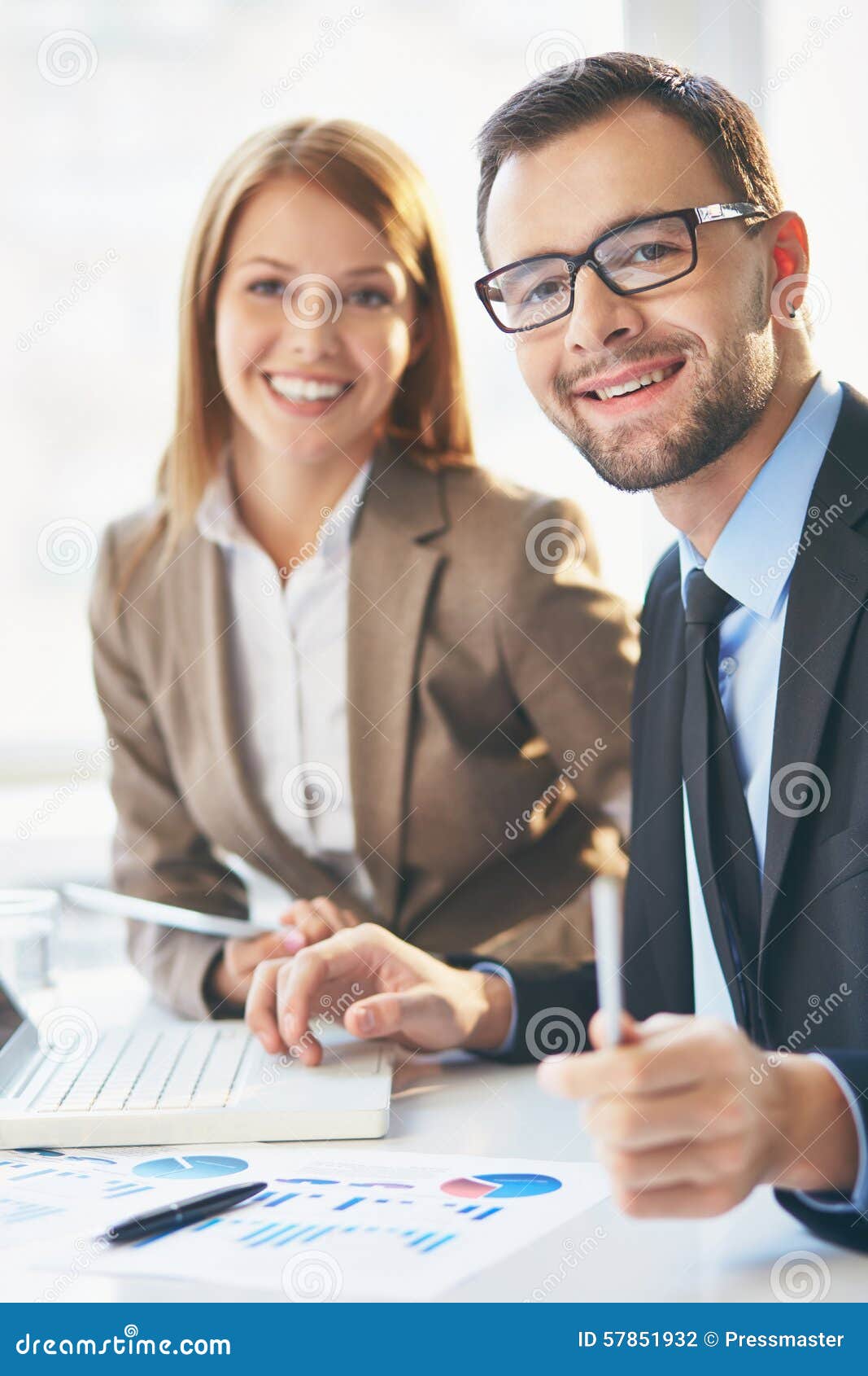 Colleagues working stock photo. Image of laptop, businessman - 57851932