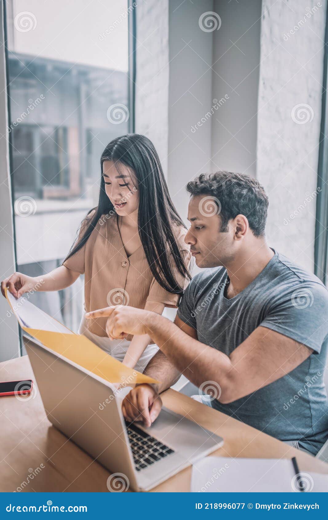 Colleagues Working in the Office and Looking Involved Stock Image ...