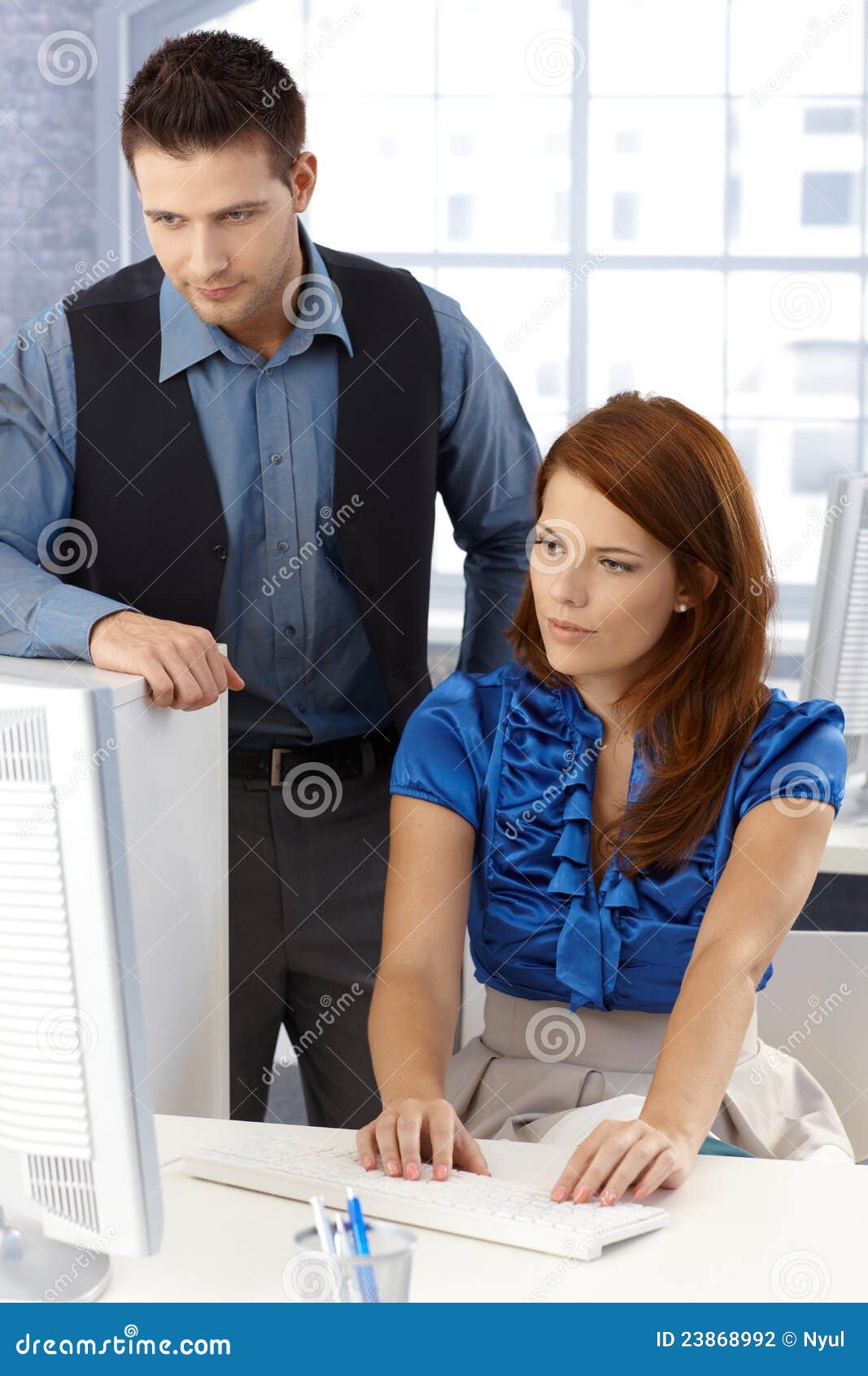 Colleagues Working Together Stock Photo - Image of face, computer: 23868992