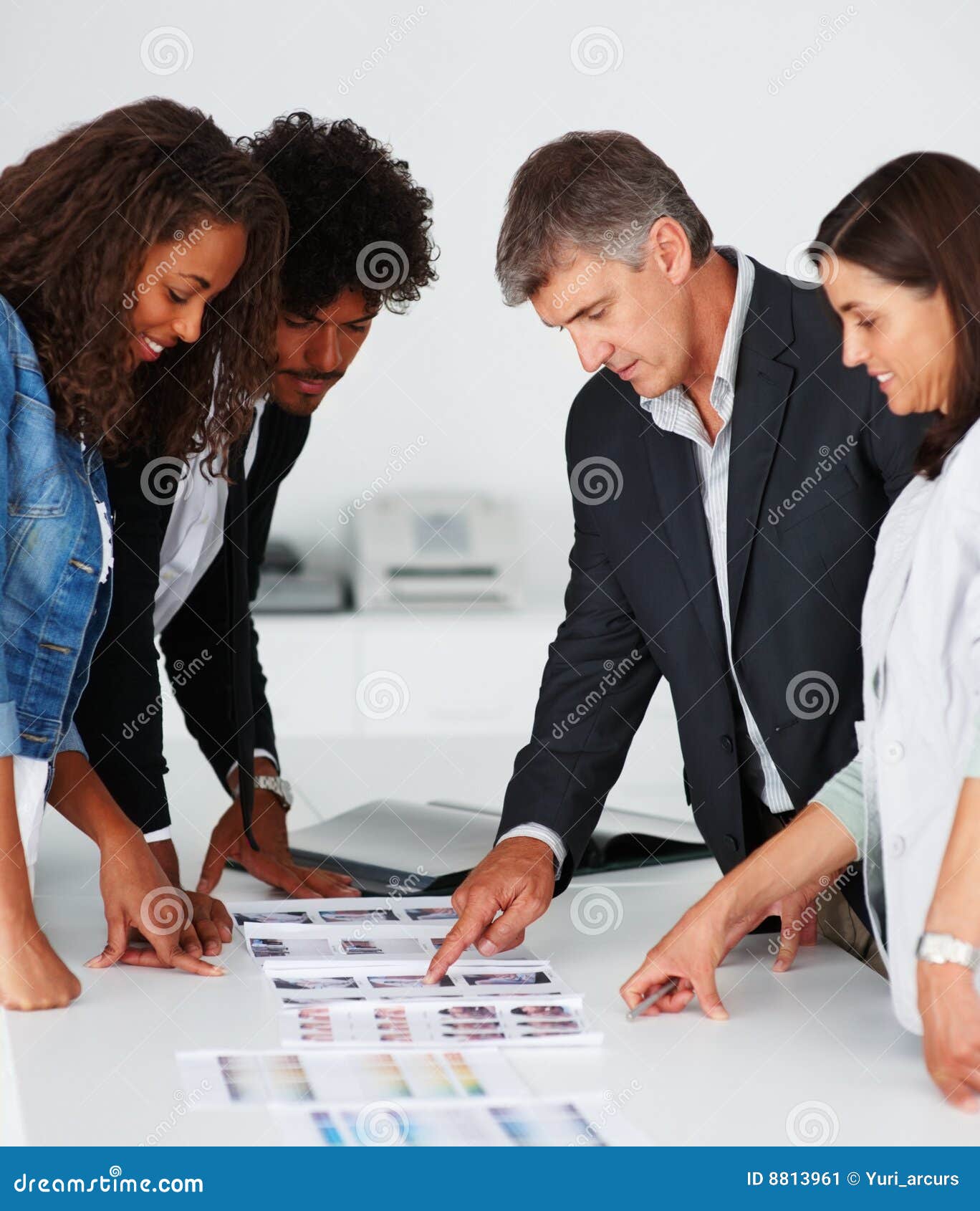 Colleagues Working Together on a Document Stock Image - Image of modern ...