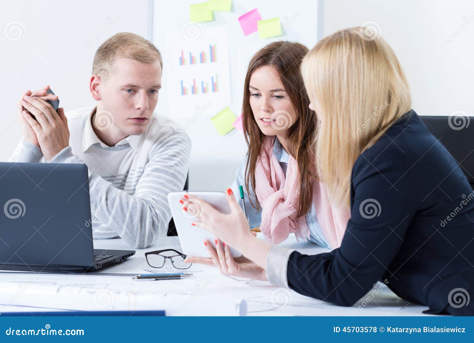 Colleagues Working From Home Pointing On Chart Stock Image ...