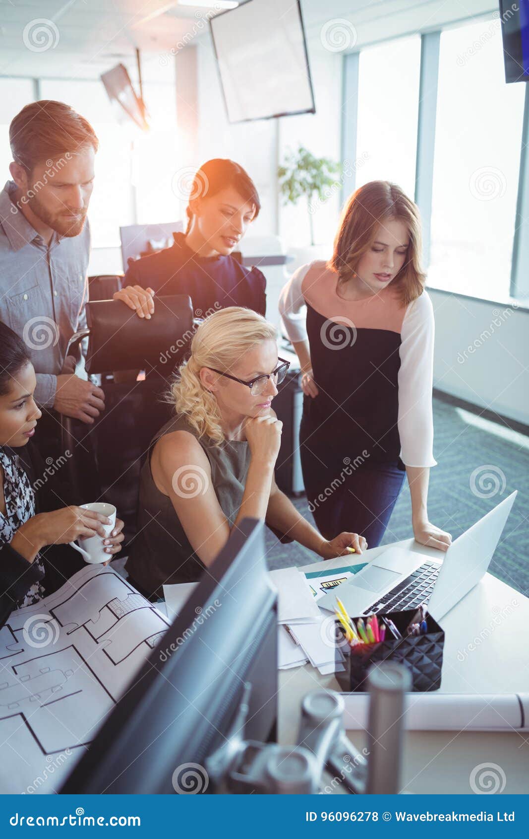 Colleagues Working Together at Office Stock Photo - Image of discussing ...