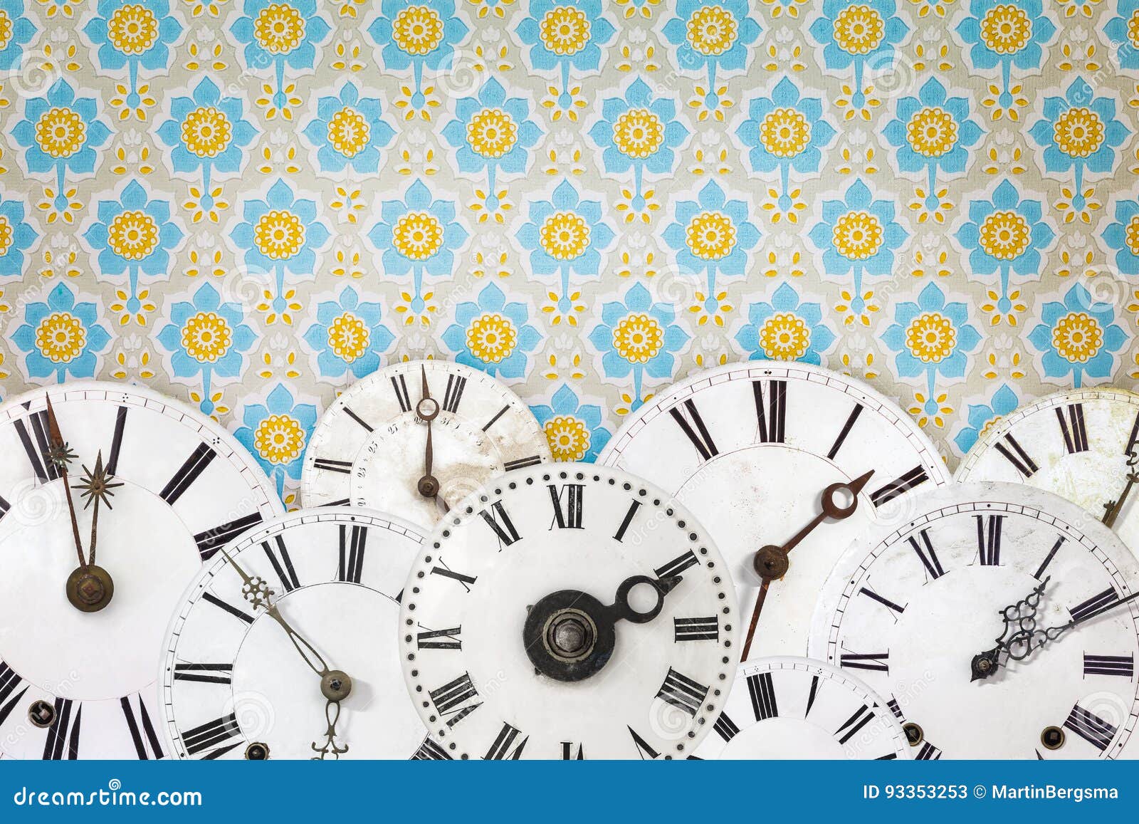 Collection of Ancient Clock Faces in Front of Retro Wallpaper Stock ...