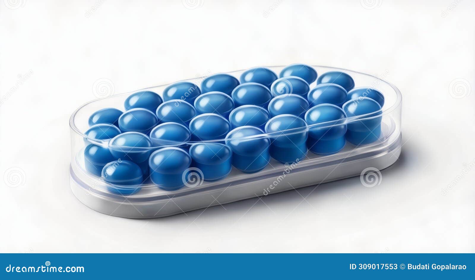 A Collection of Blue Glass Marbles in a Plastic Container Stock ...