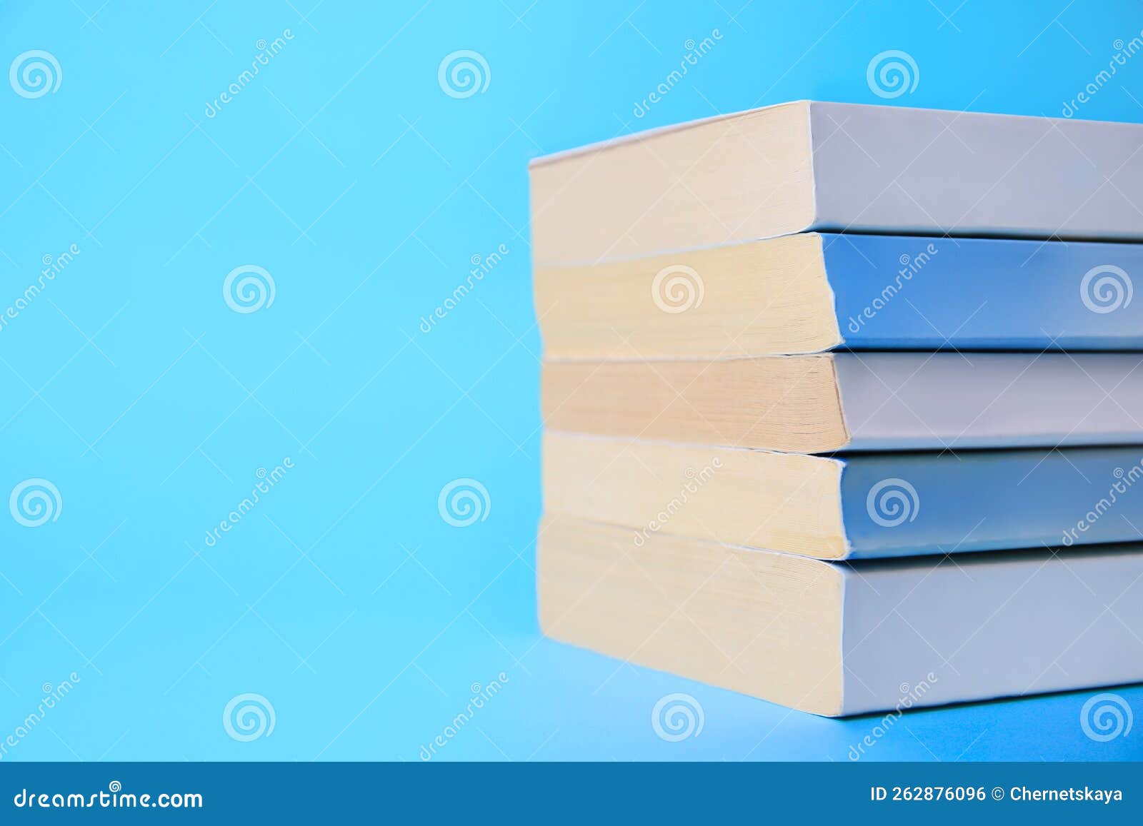 Collection of Books on Light Blue Background, Space for Text Stock ...