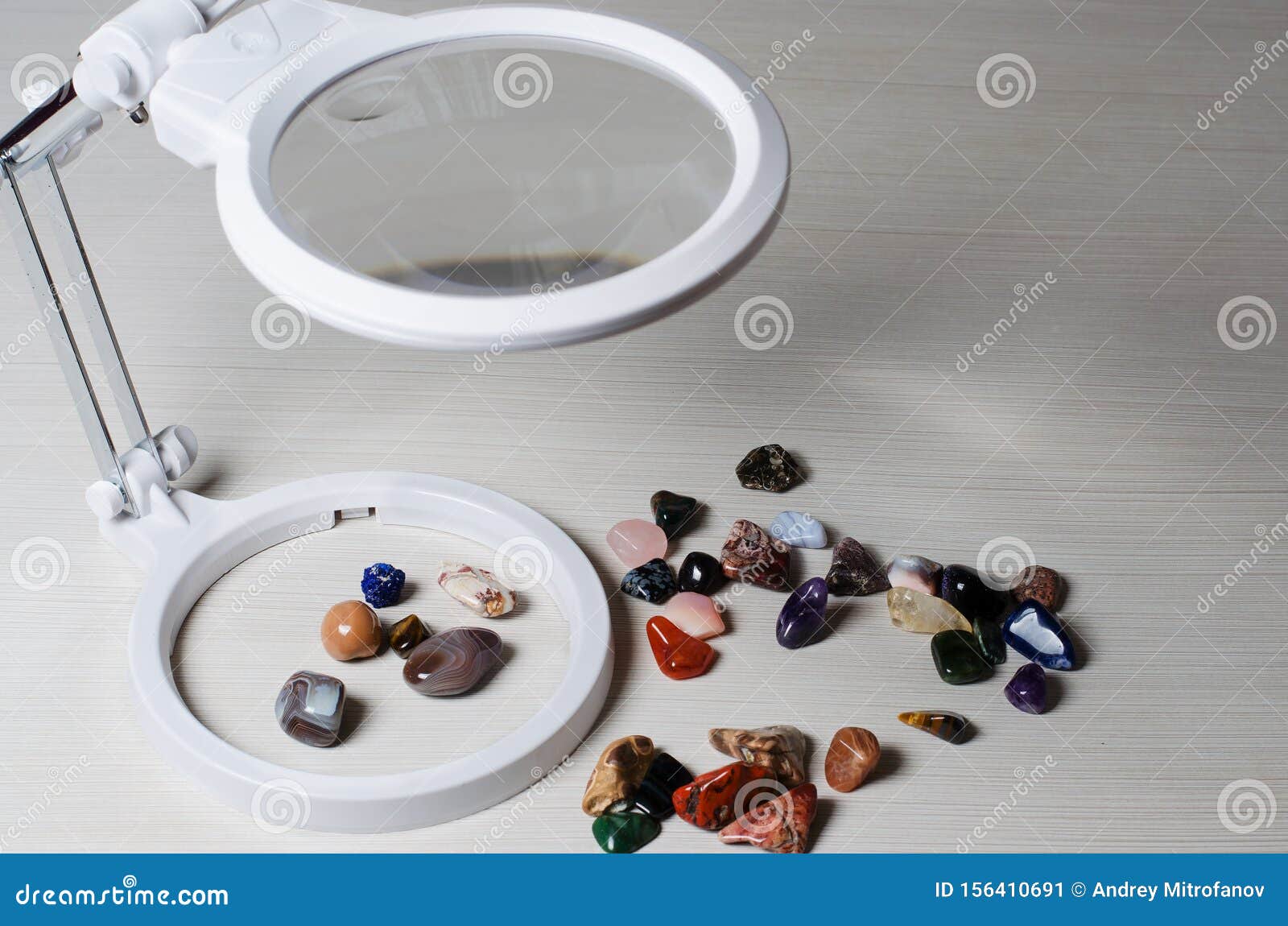 Collection of Colored Minerals. Large Magnifying Lens for the Study of ...
