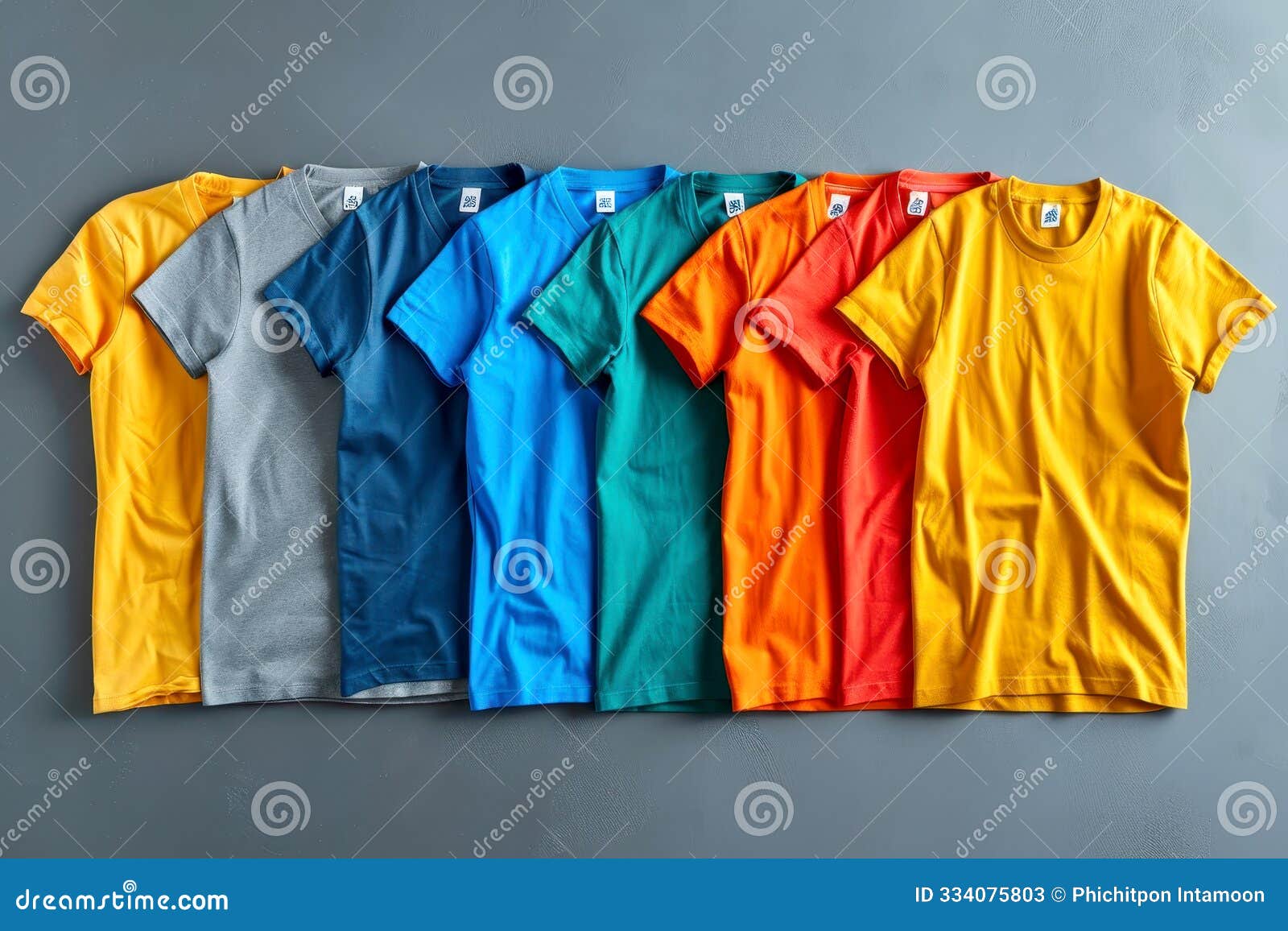 A Collection of Colored T-shirt Templates for Men on Plain Background ...