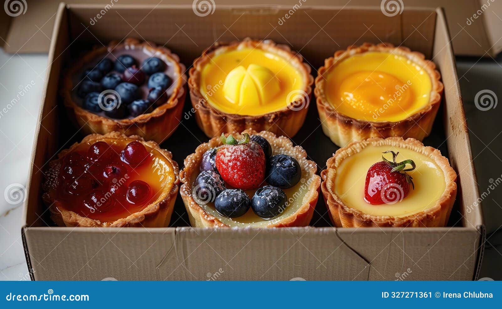 A Collection of Colorful Fruit Tarts in a Box Stock Illustration ...