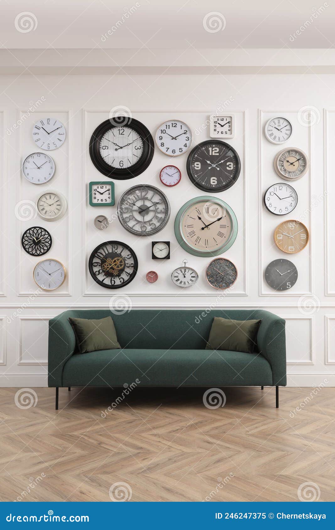Collection of Different Clocks and Comfortable Sofa in Stylish Room ...