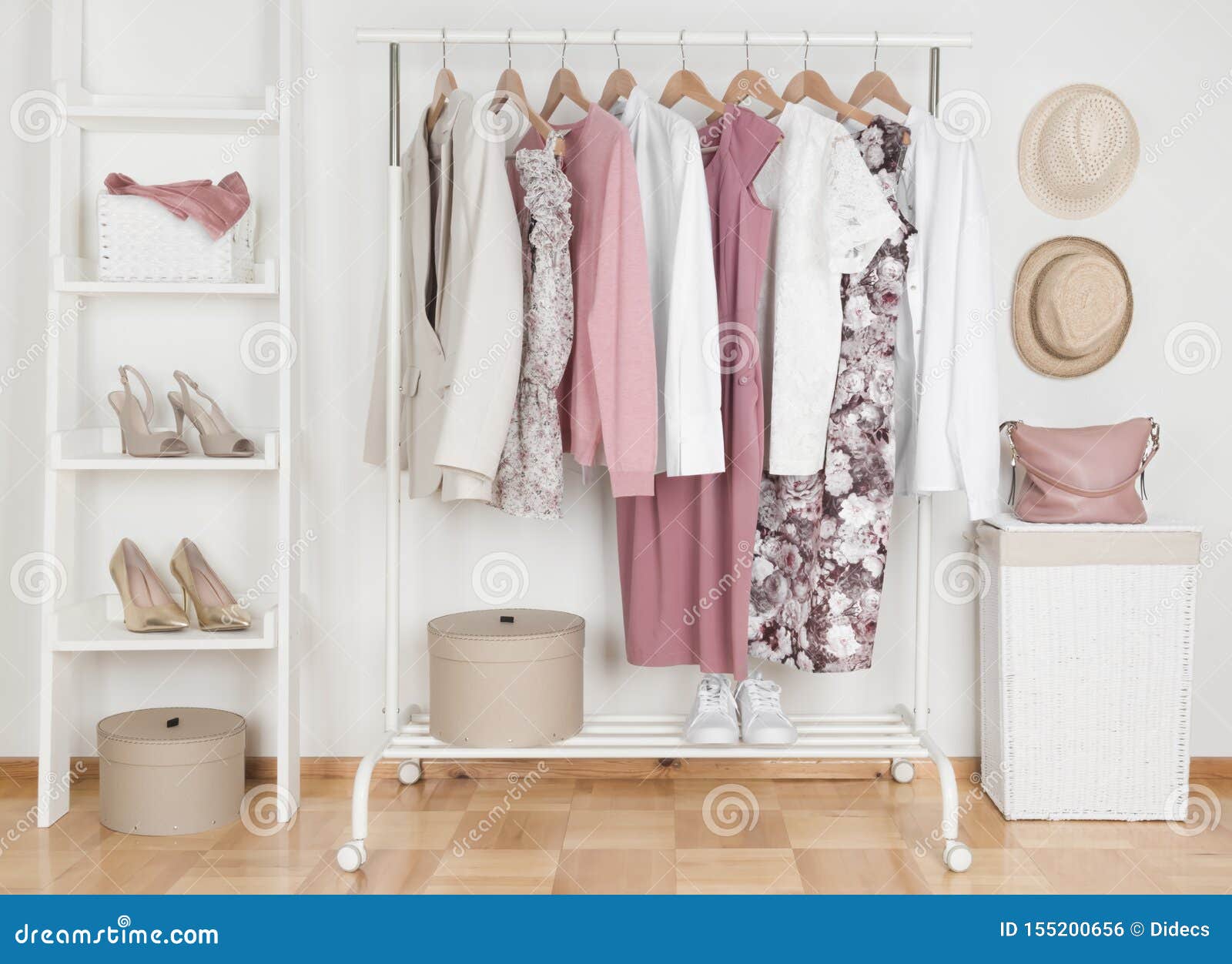 Collection of Female Clothes Hanging on Rack in Dressing Room Stock ...
