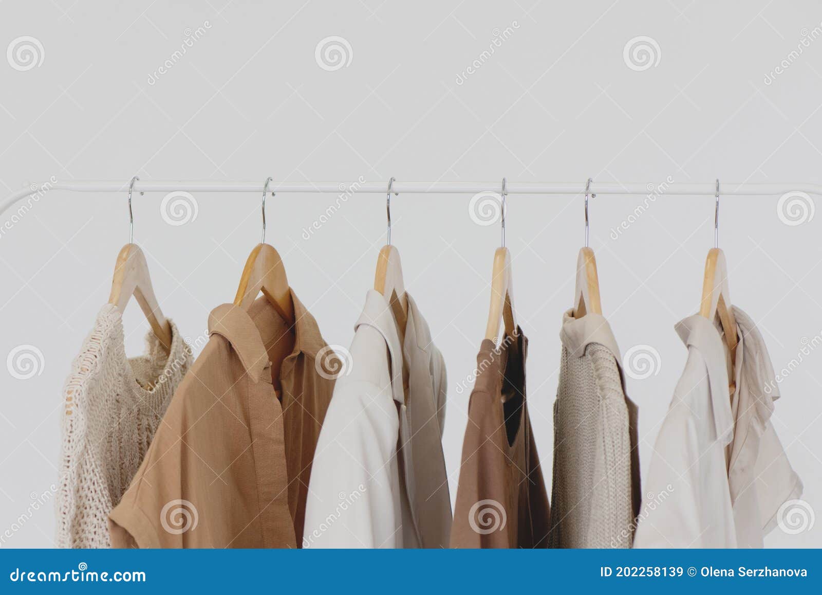 Collection of Female Clothes Hanging on a Rack. Stock Image - Image of ...