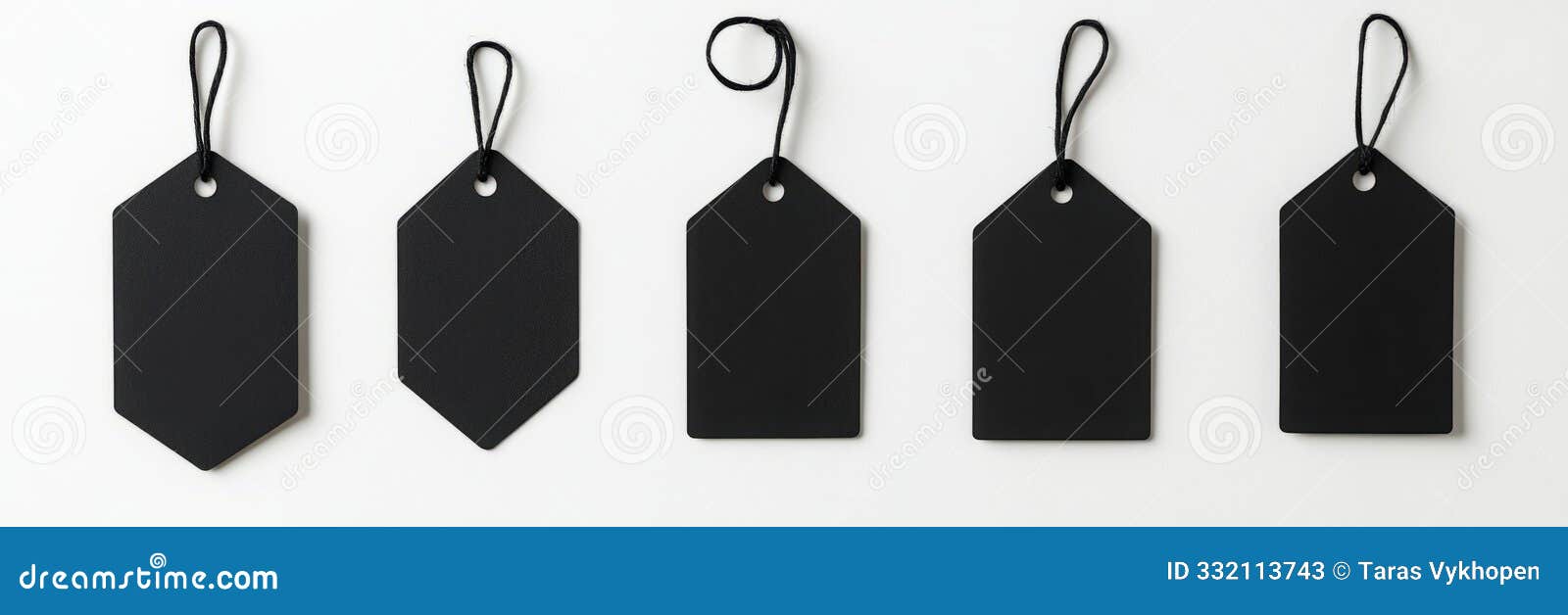 Collection of Five Blank Black Tags Arranged in a Row on a Light ...
