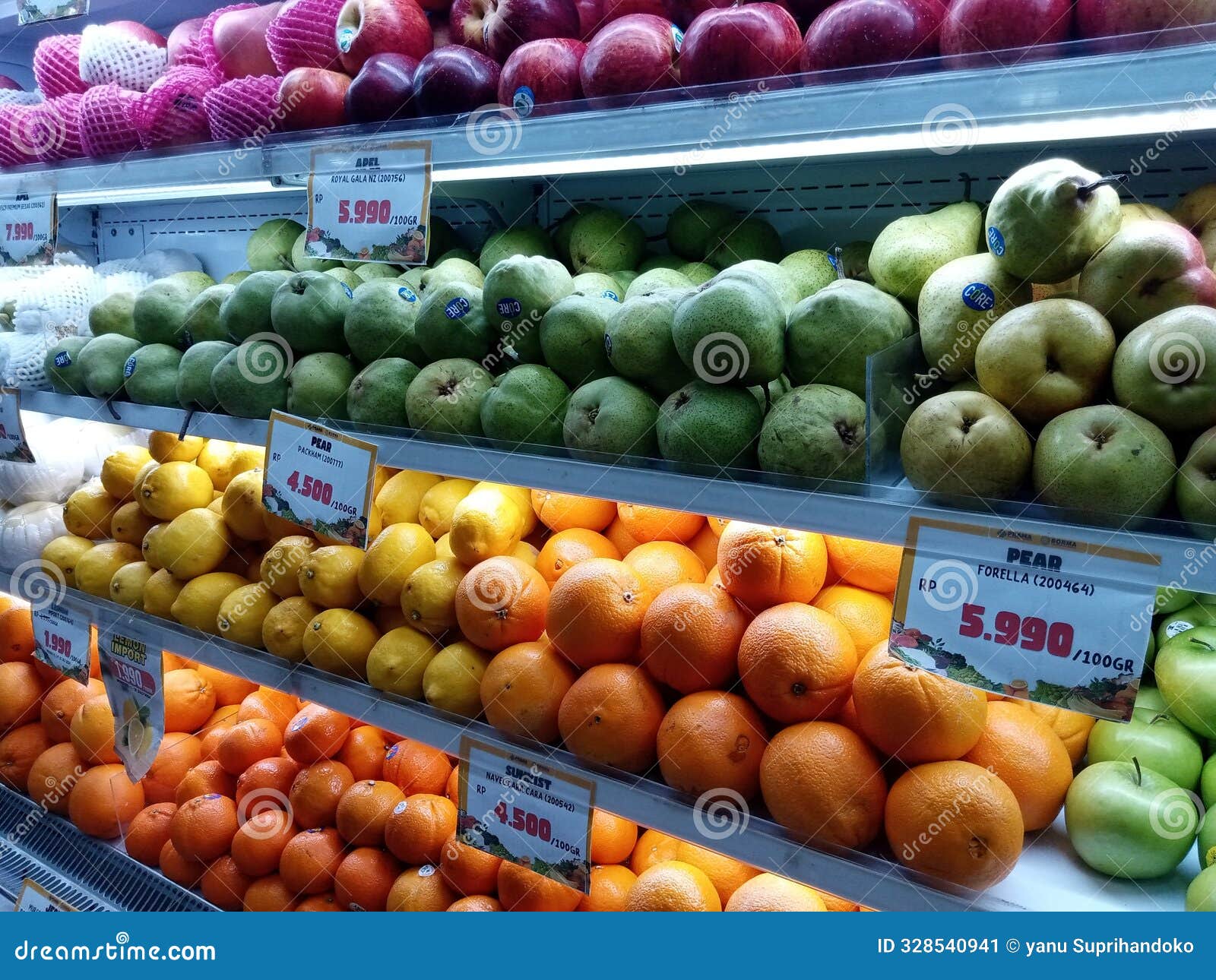 A Collection of Fresh Fruit Arranged Neatly on the Fruit Shelf Stock ...