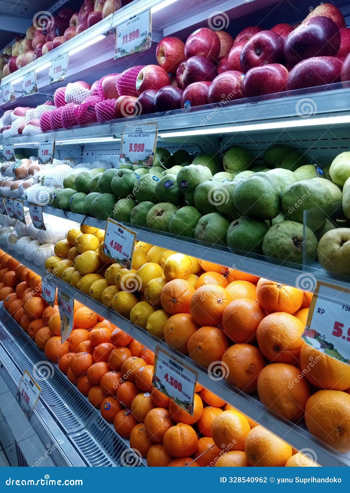A Collection of Fresh Fruit Arranged Neatly on the Fruit Shelf Stock ...