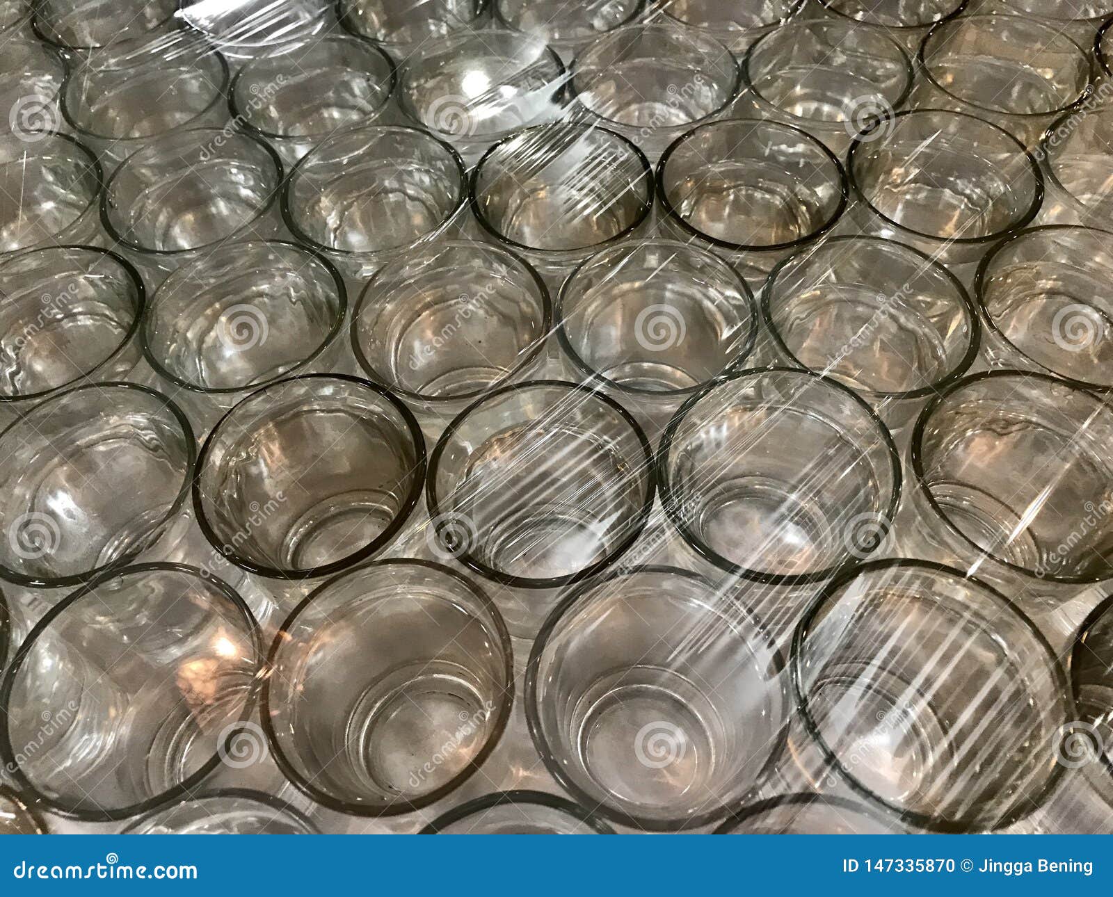 A collection of glass cups stock photo. Image of collection - 147335870