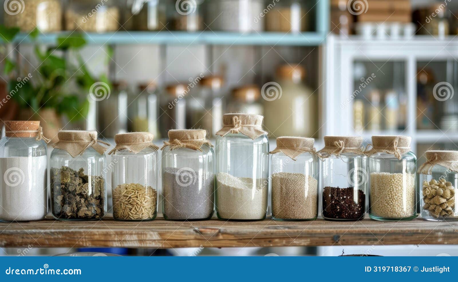 A Collection of Glass Jars Labeled for Different Bulk Items Reducing ...