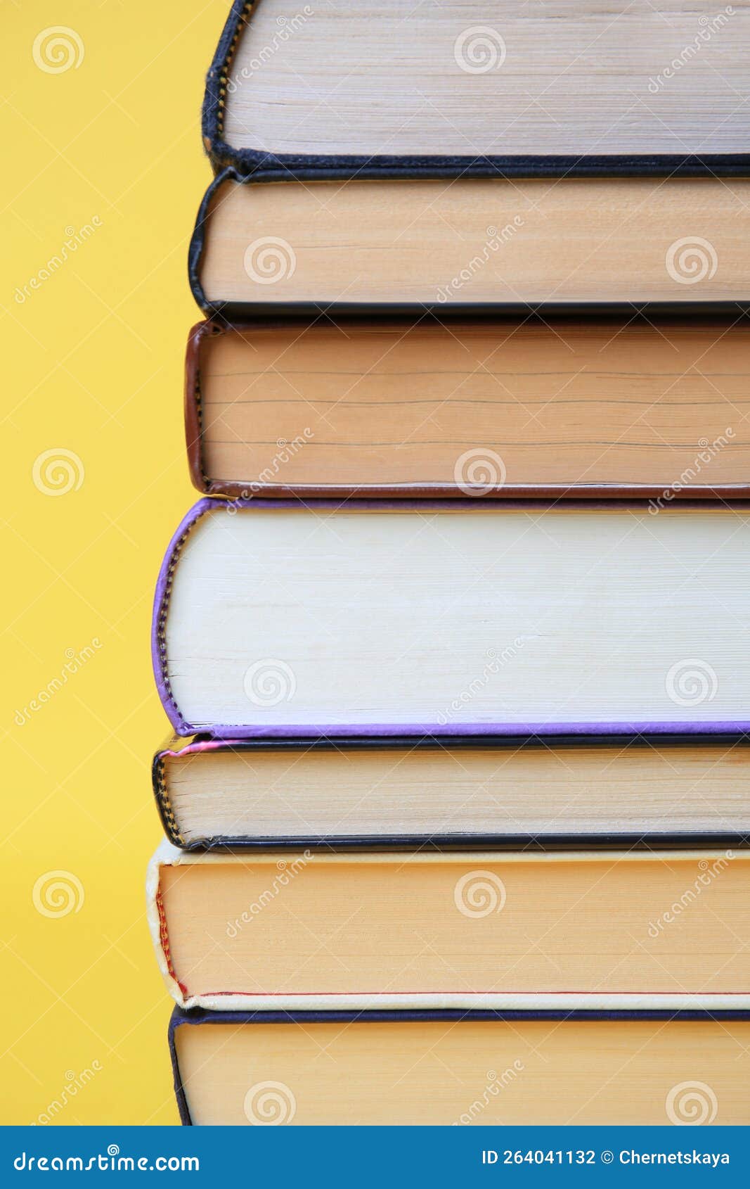 Collection of Hardcover Books on Yellow Background Stock Photo - Image ...