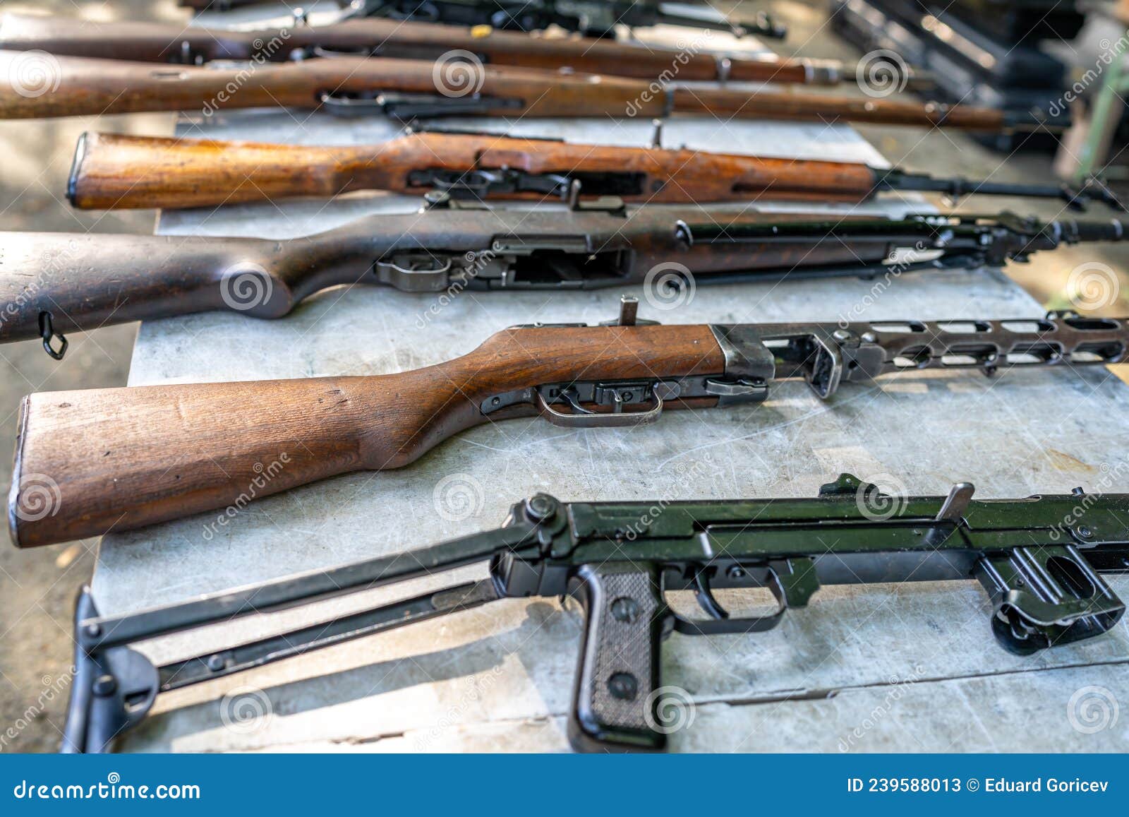 Collection of Historical and Modern Weapons on the Shooting Range Stock ...